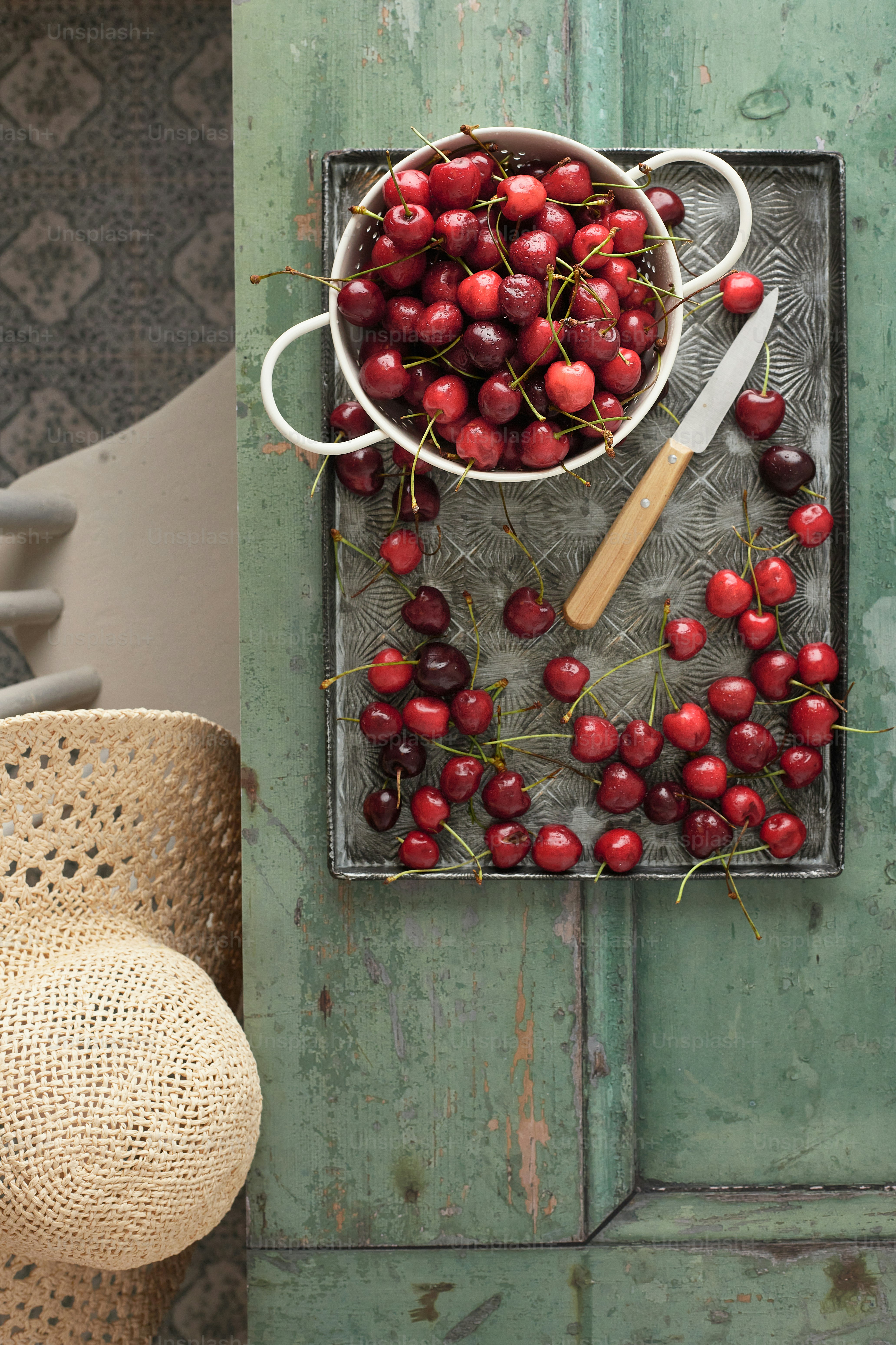 A bowl of cherries on a metal tray photo – Fruit background Image on ...