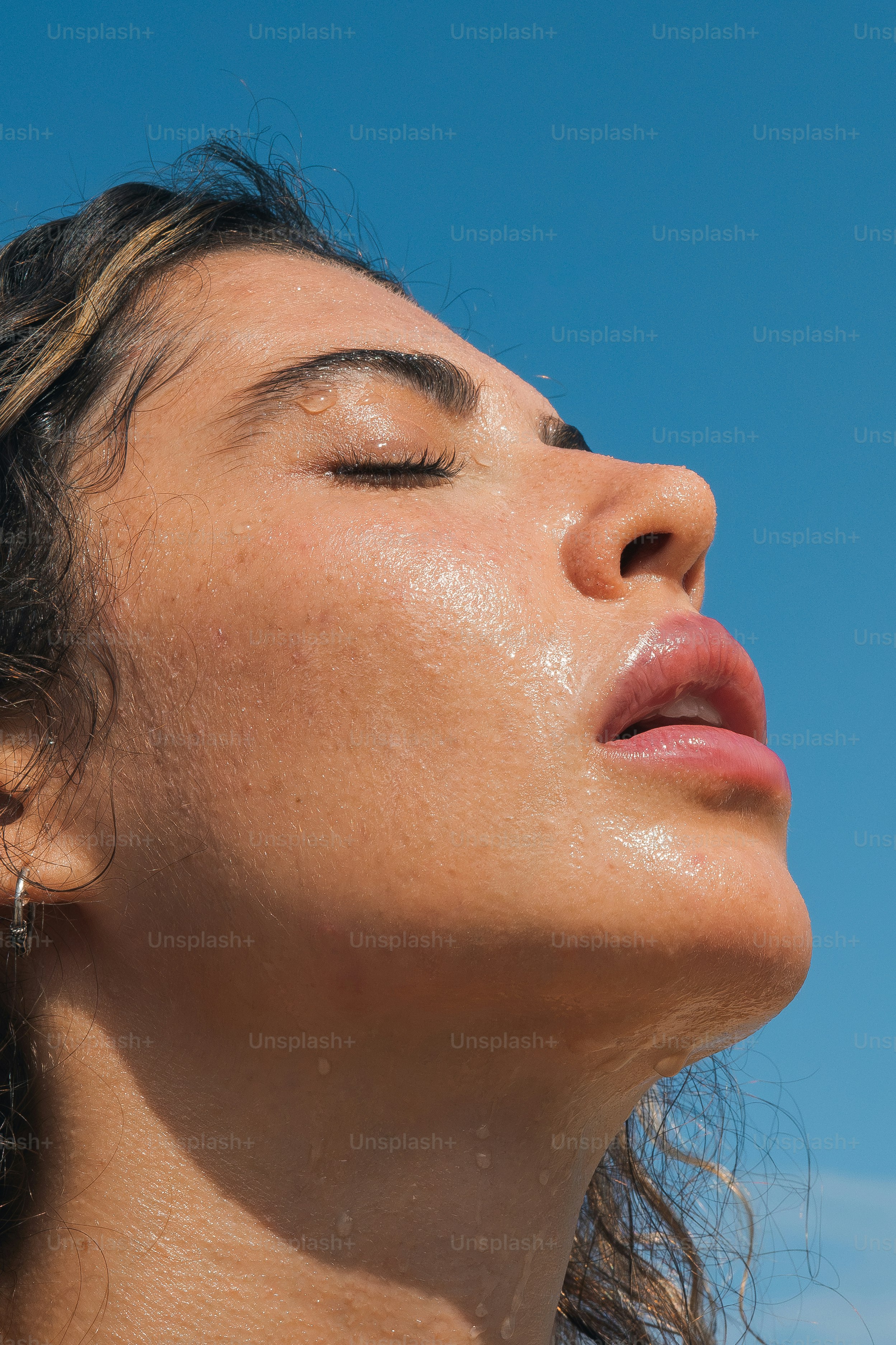 A close up of a woman with her eyes closed photo – Sweltering Image on ...
