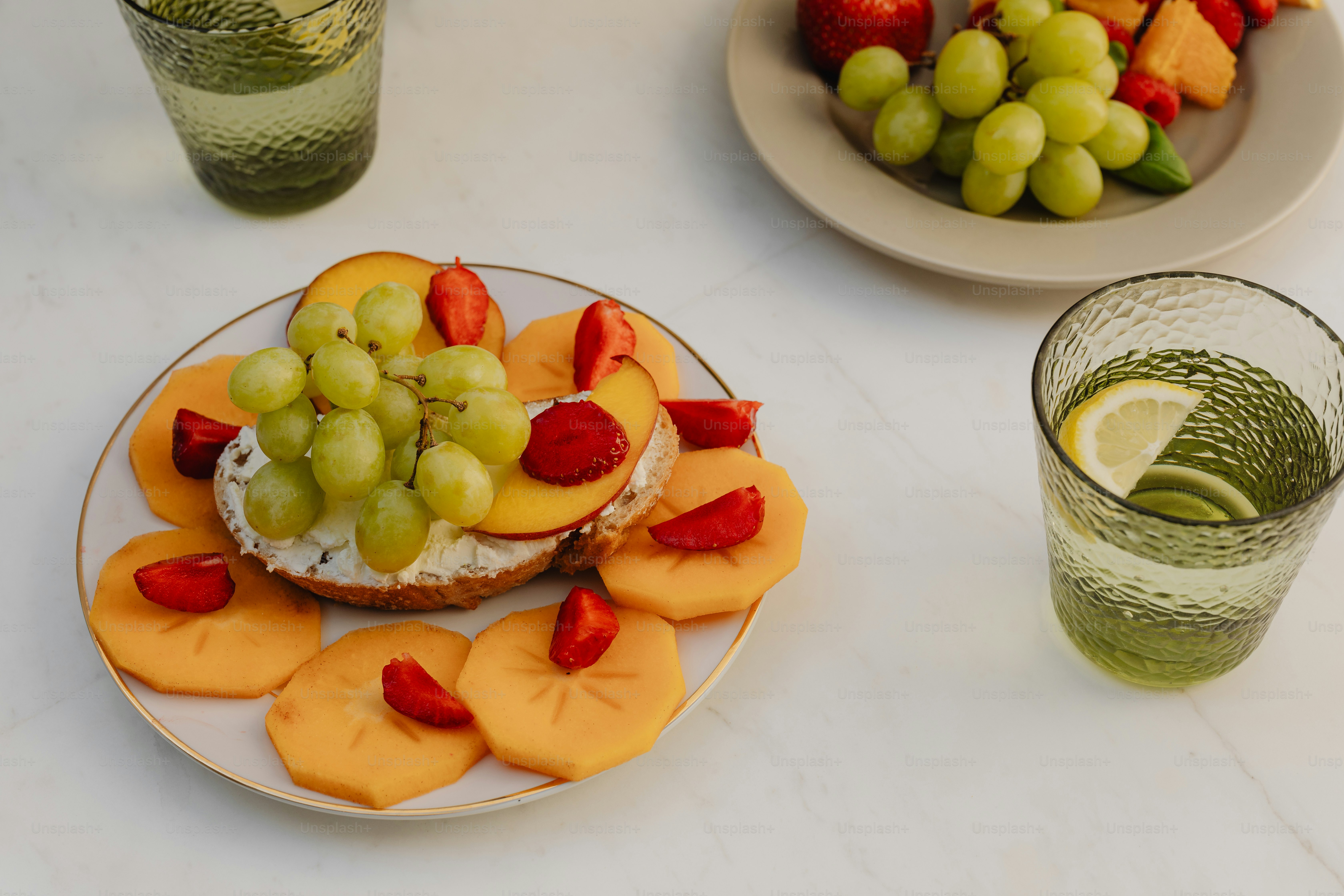 A plate of fruit is on a table photo – Summer Image on Unsplash