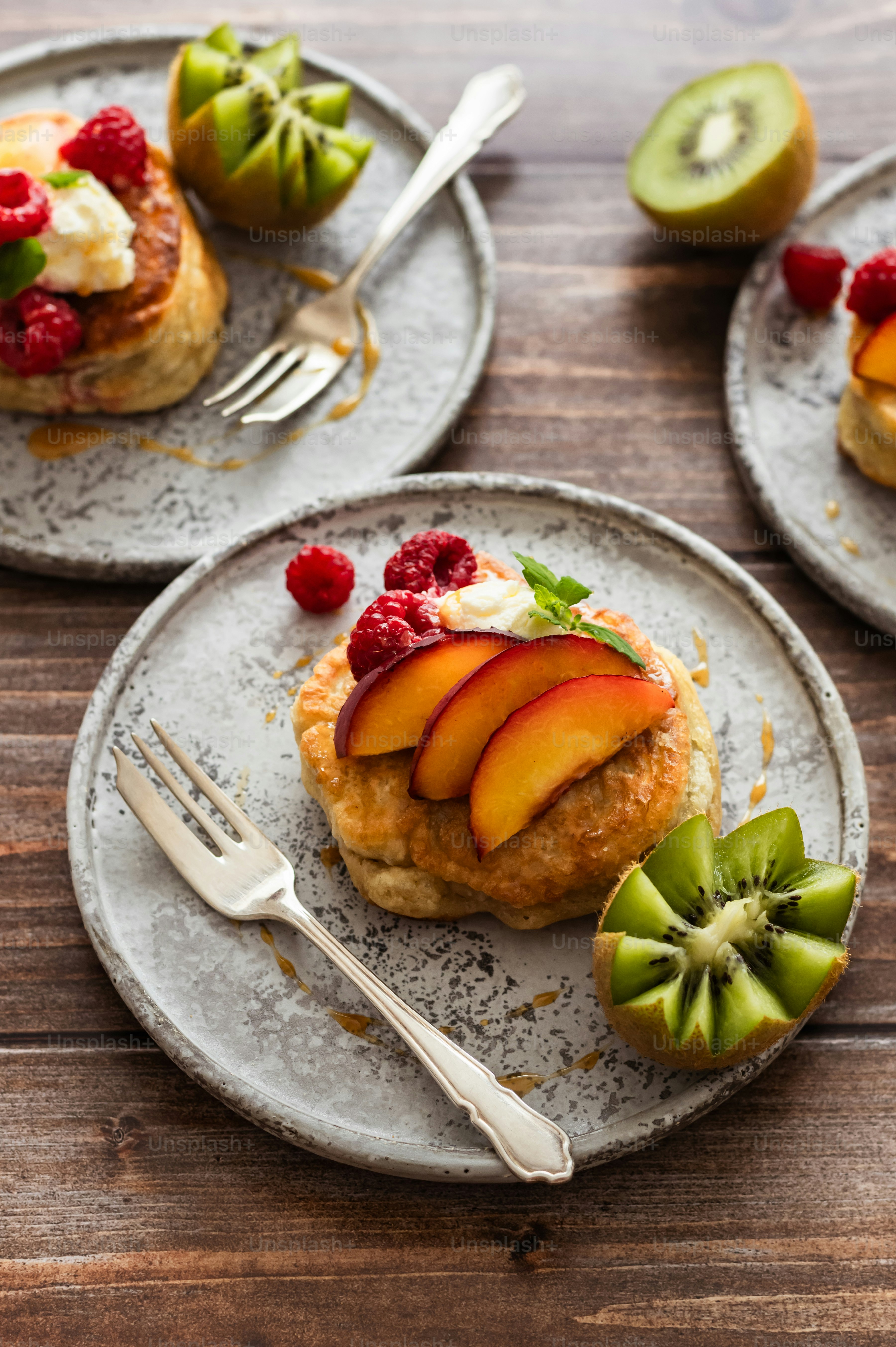 A couple of plates that have some food on them photo – Healthy food ...