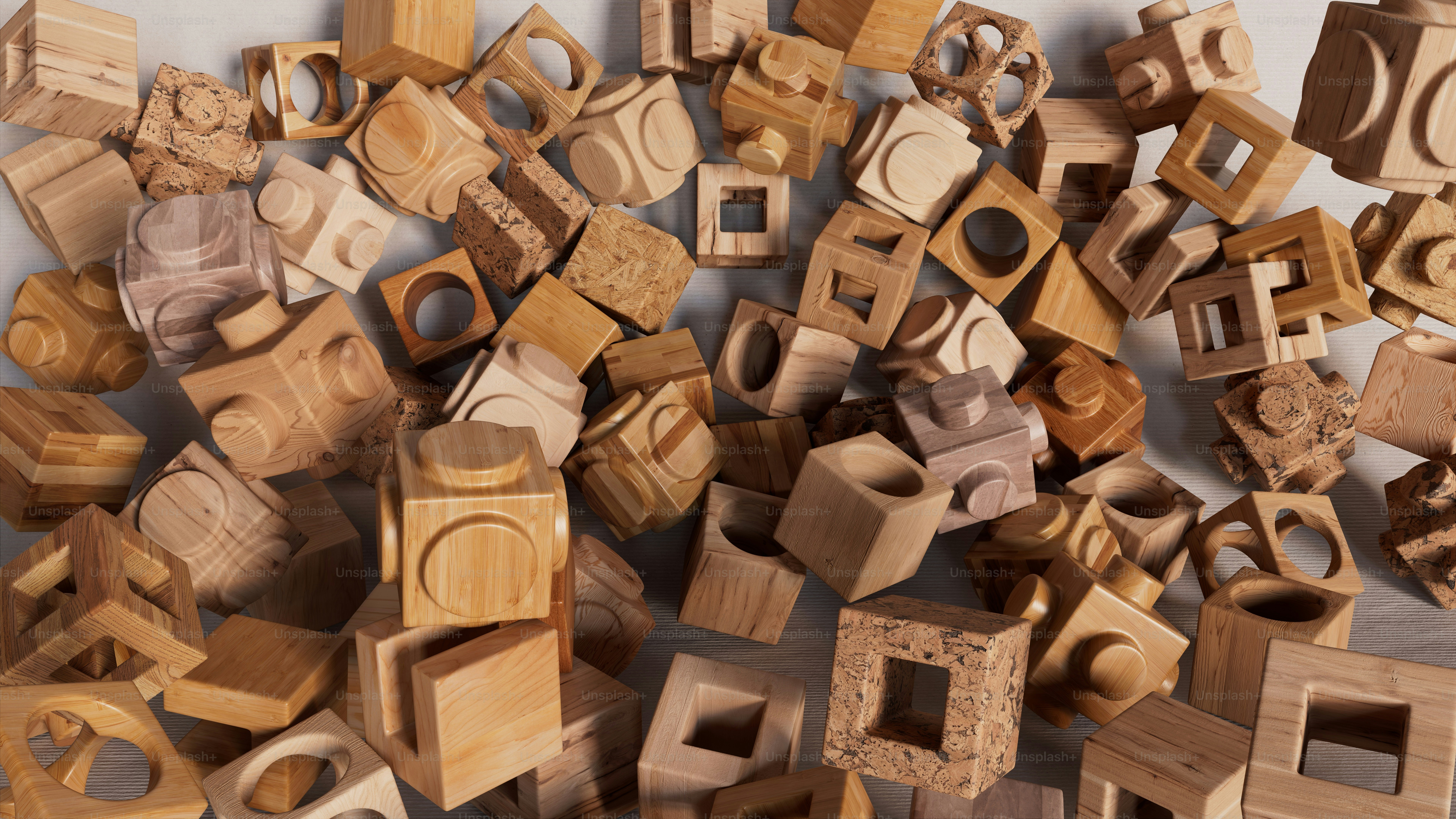 A pile of wooden blocks sitting on top of a table photo – 3d render ...