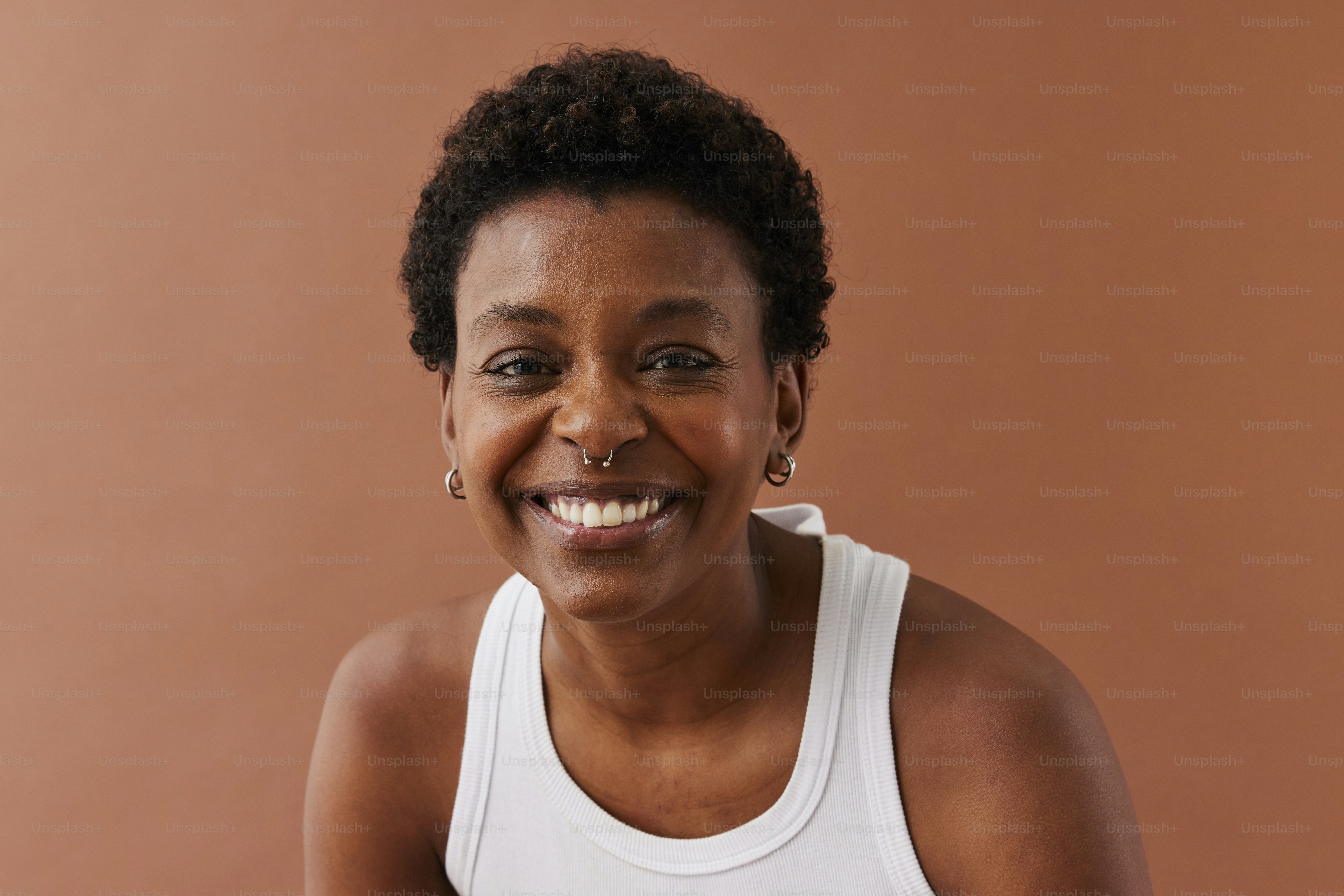 A woman with a smile on her face photo – Happy portrait Image on Unsplash