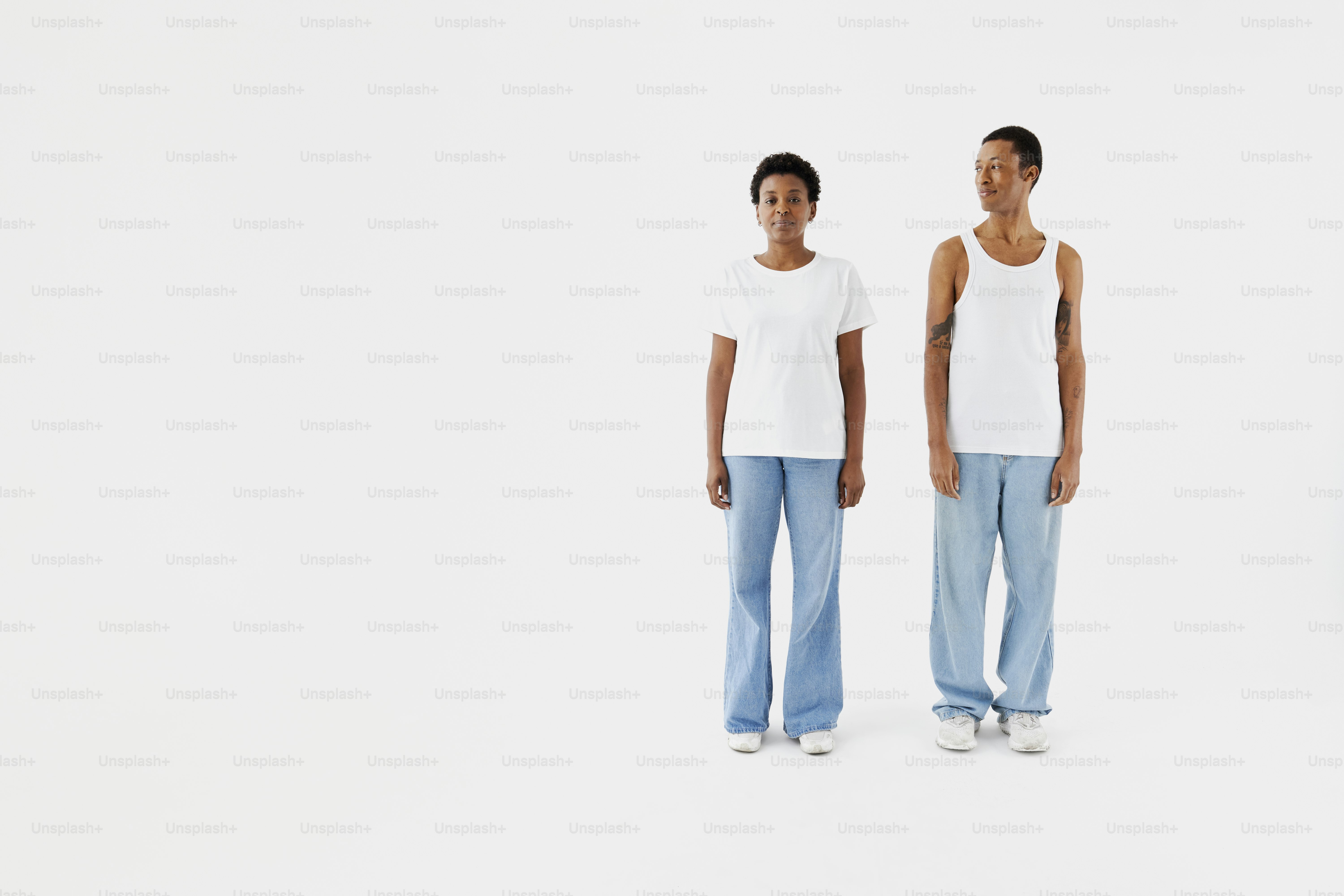 A couple of people standing next to each other photo – Woman Image on ...