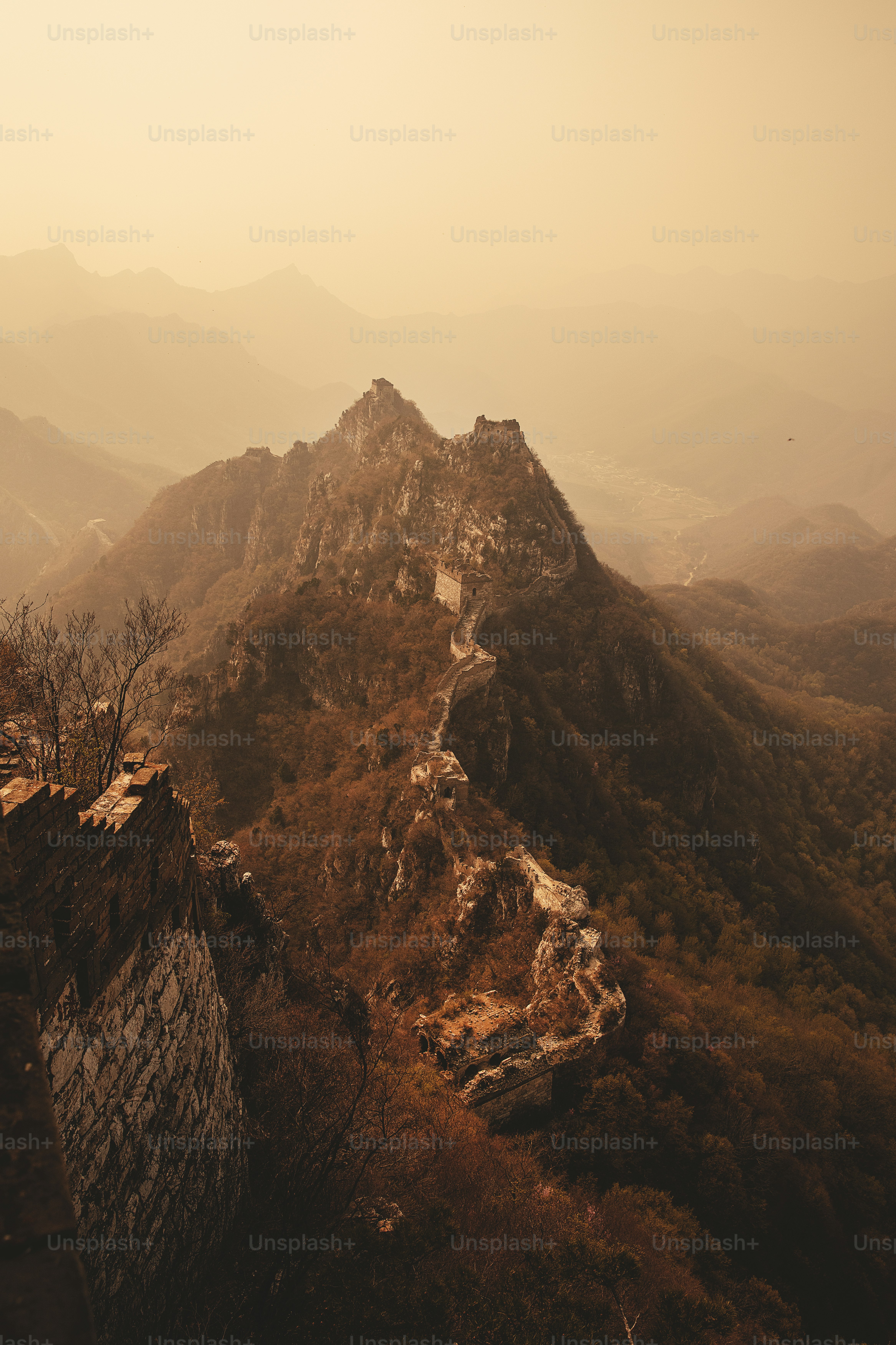 A view of the great wall of china from the top of a mountain photo ...