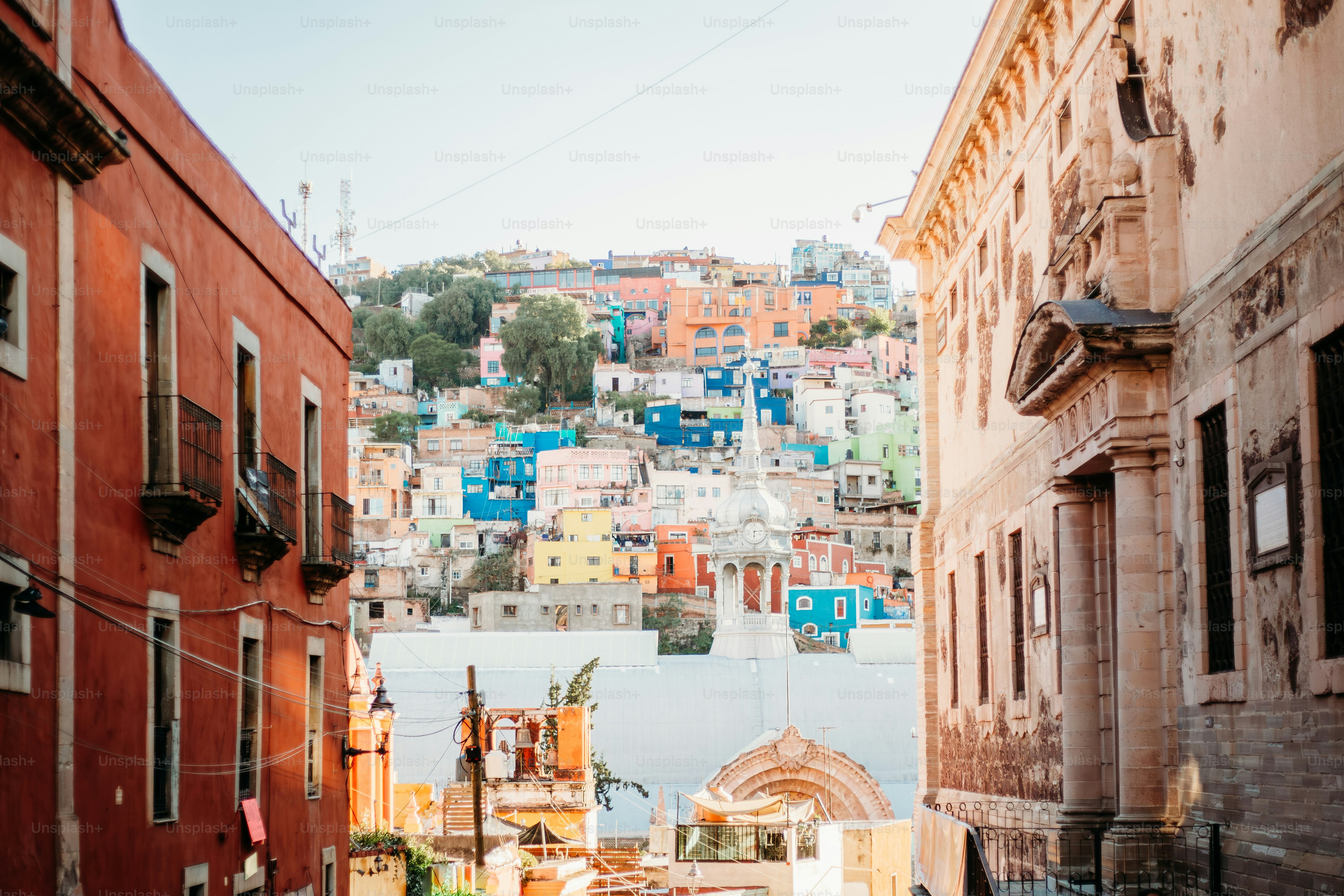 A view of a city from an alley way photo – Cityscape Image on Unsplash