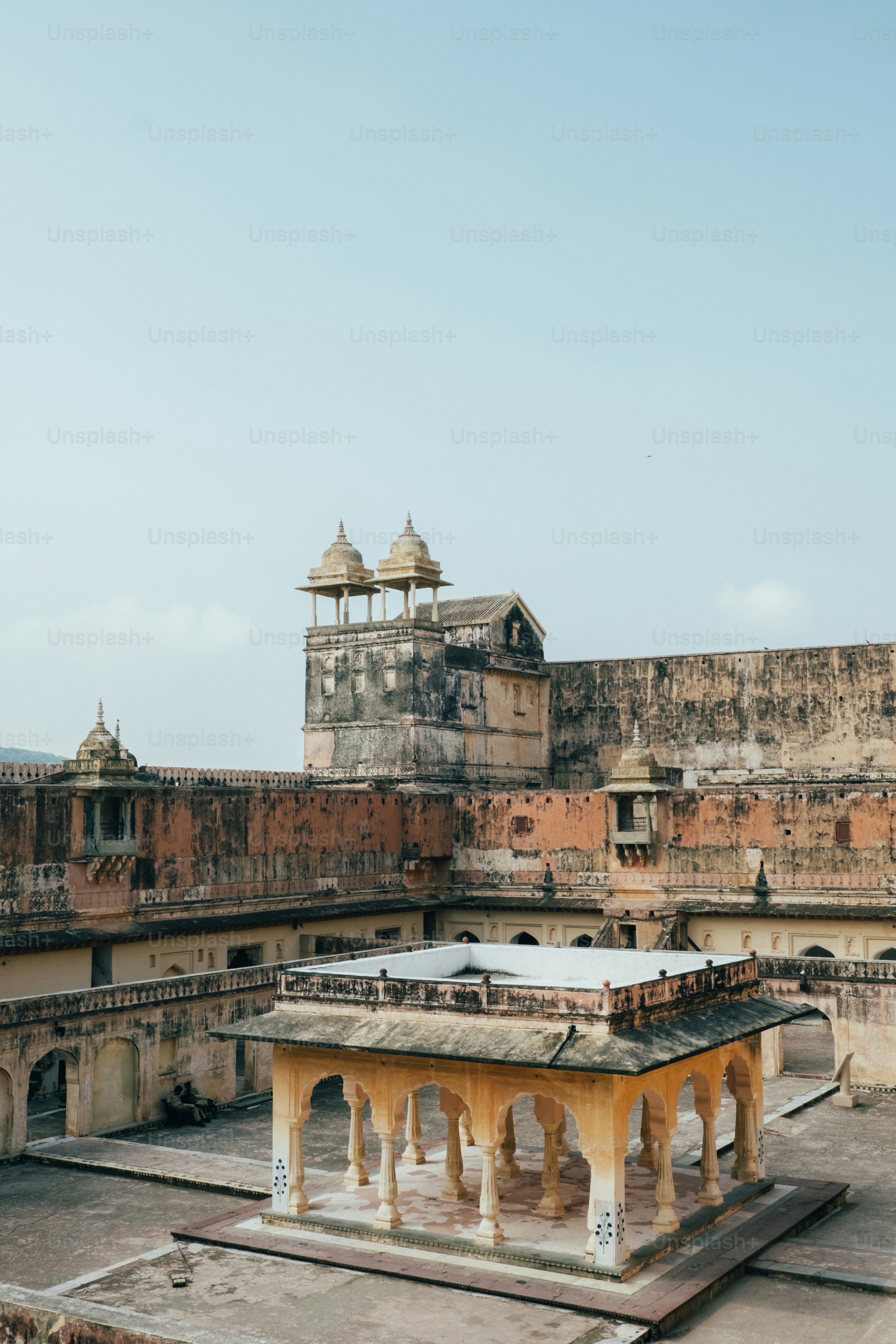 A large building with a staircase leading up to it photo – Landmark ...