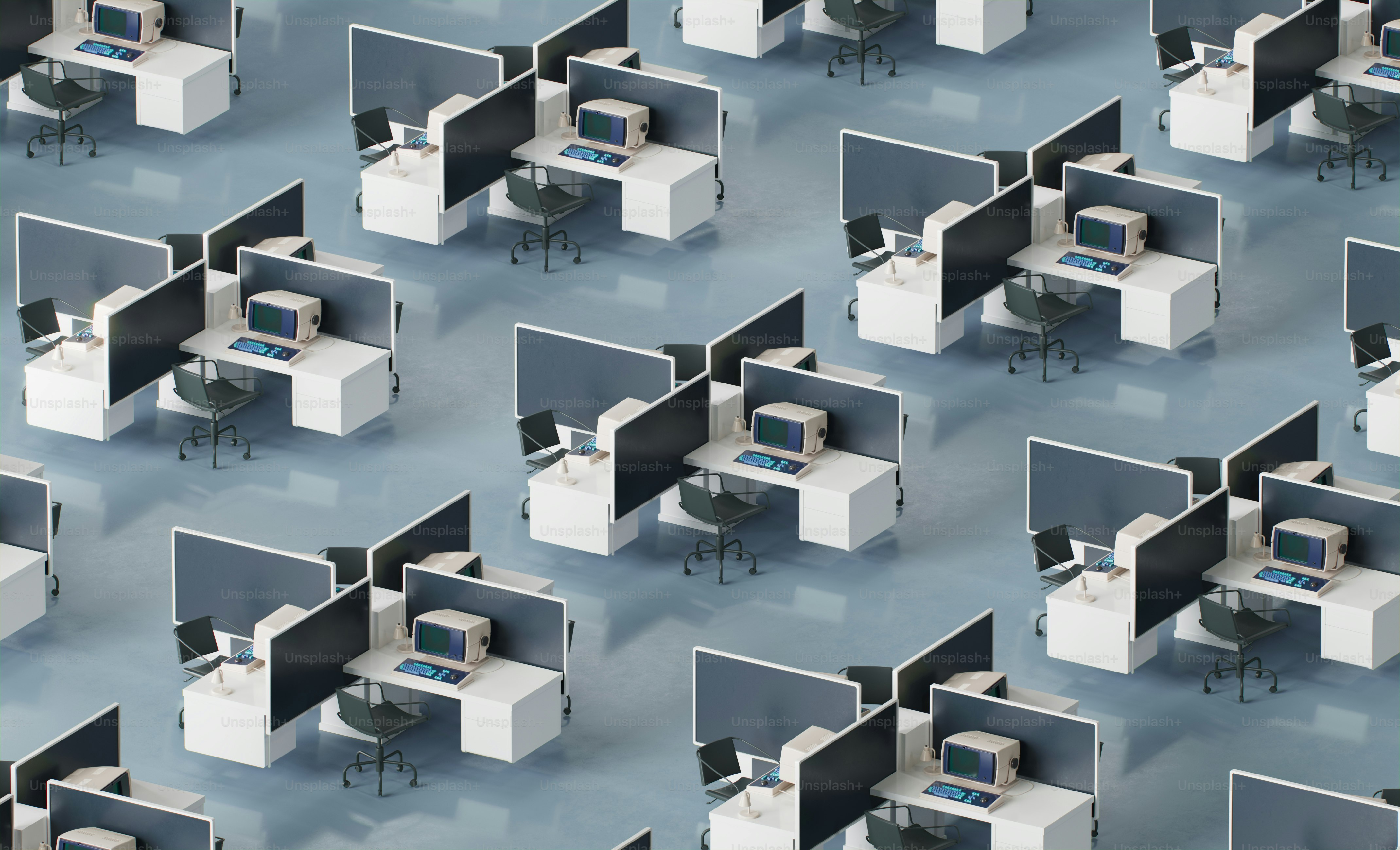 A group of cubicles with computers and desks photo – Return to work ...