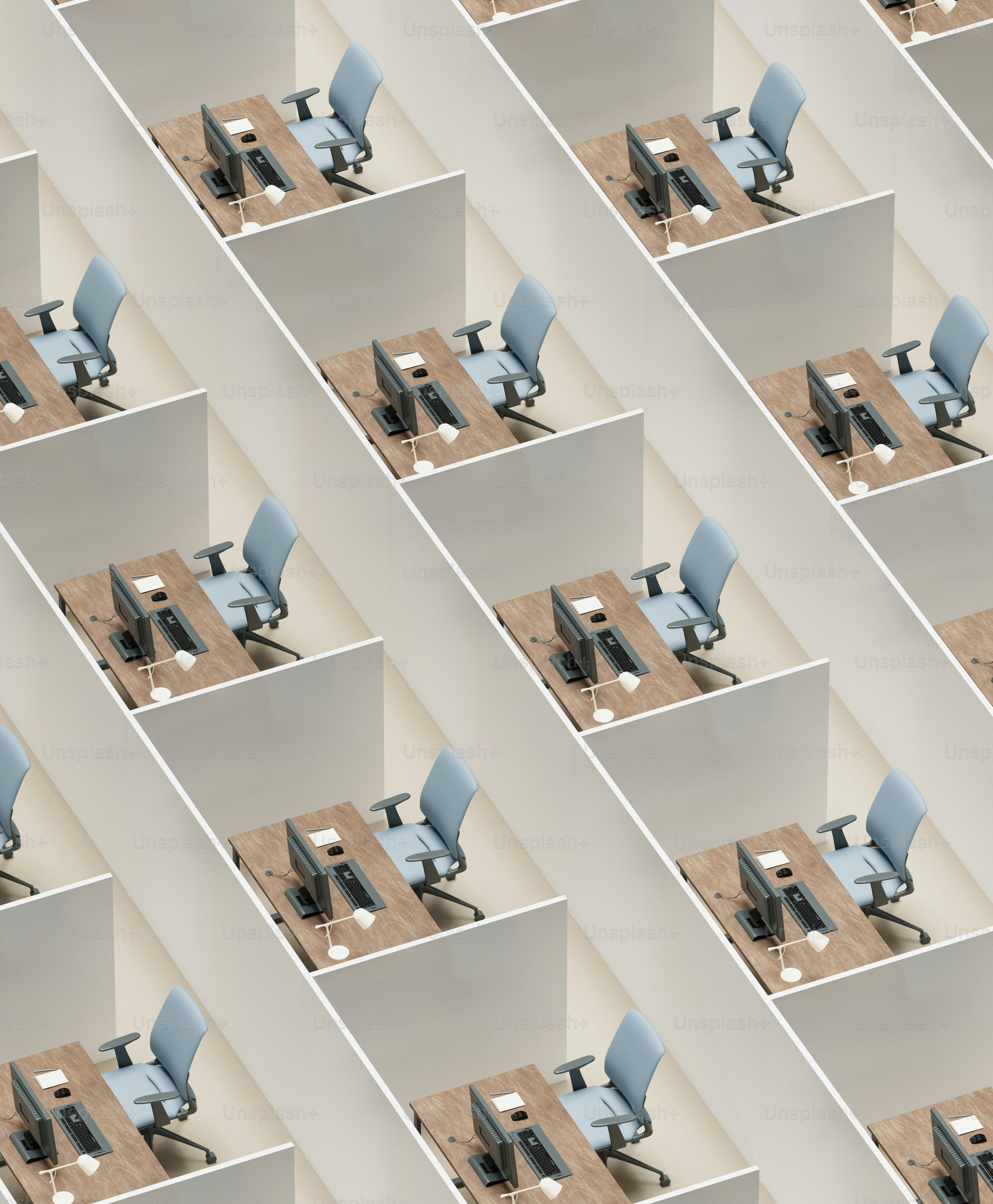 A wall of cubicles with a computer on top of them photo – Work station ...