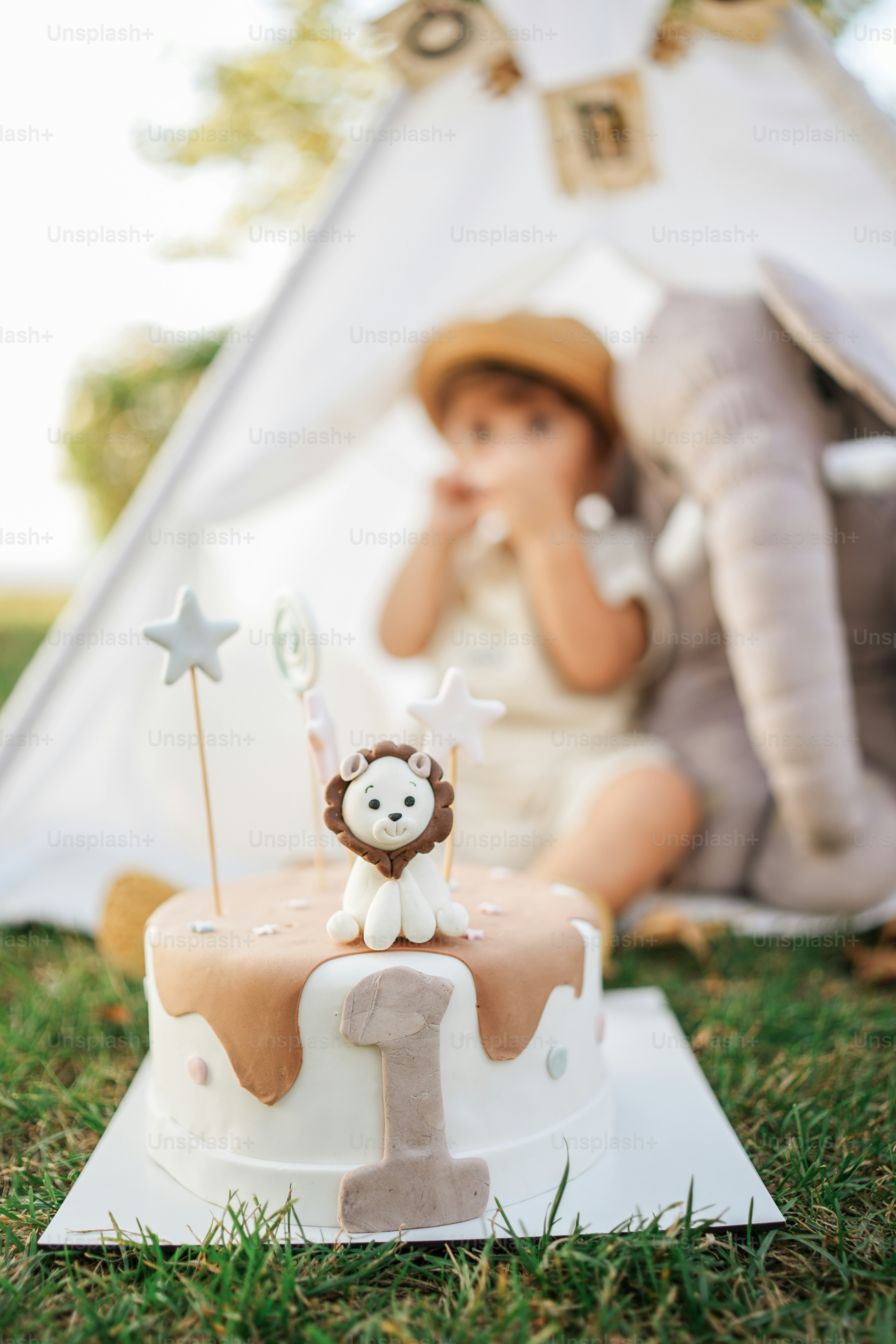 A little girl sitting in front of a cake photo – Happy birthday Image ...