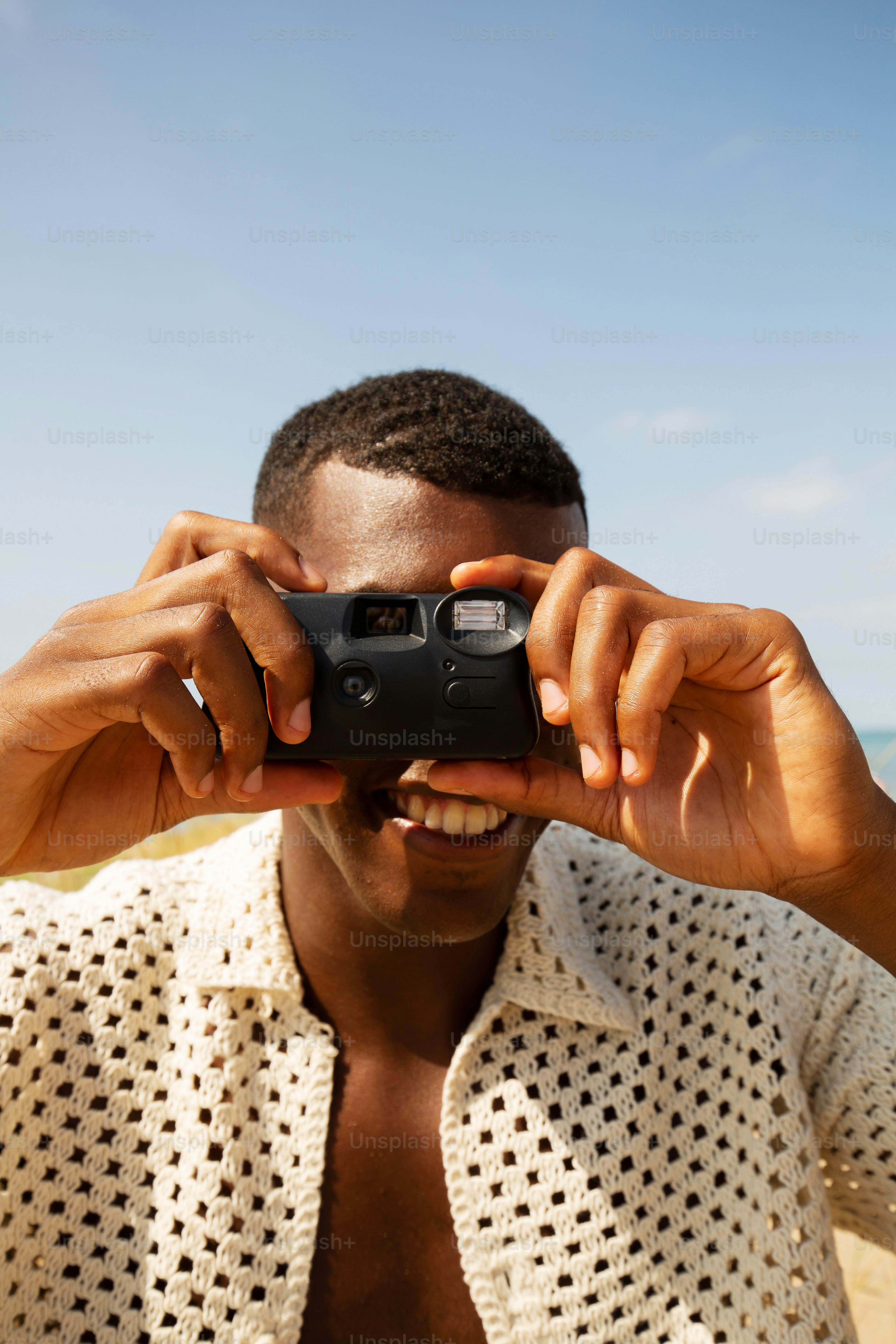 A man taking a picture with his cell phone photo – Portrait Image on ...