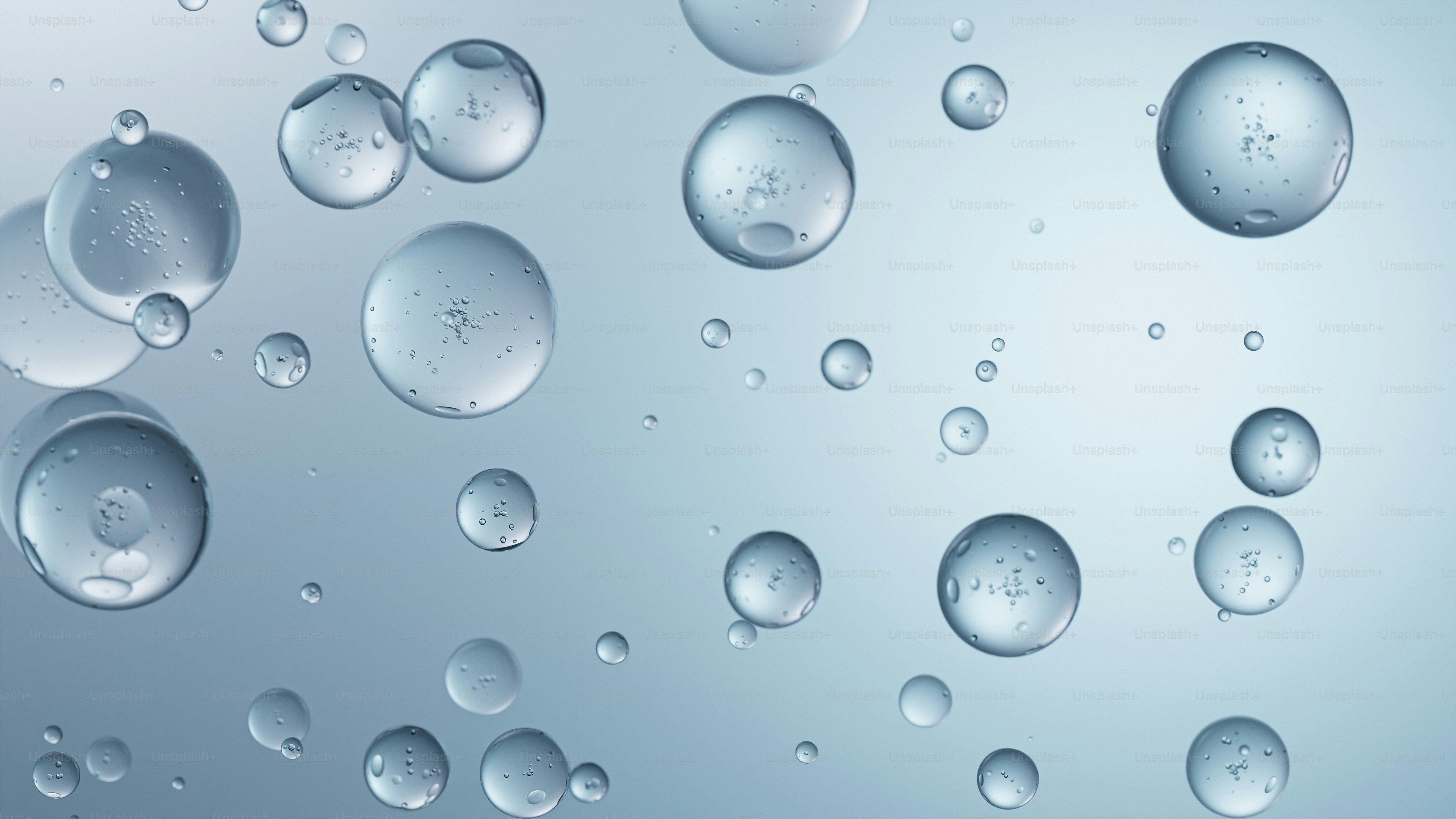 A bunch of water droplets on a blue background photo – Background Image ...