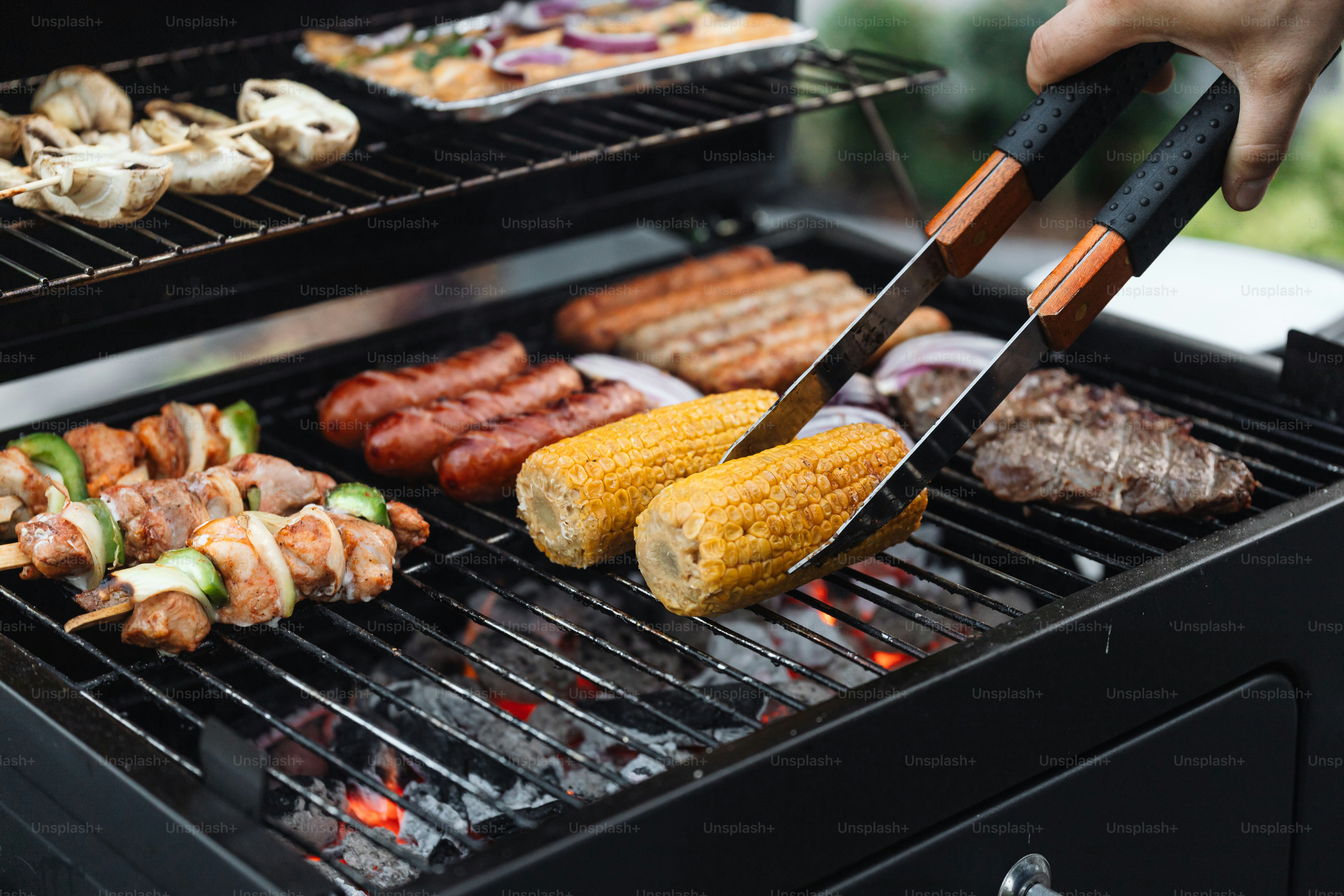 A bunch of food is cooking on a grill photo – Grilling Image on Unsplash
