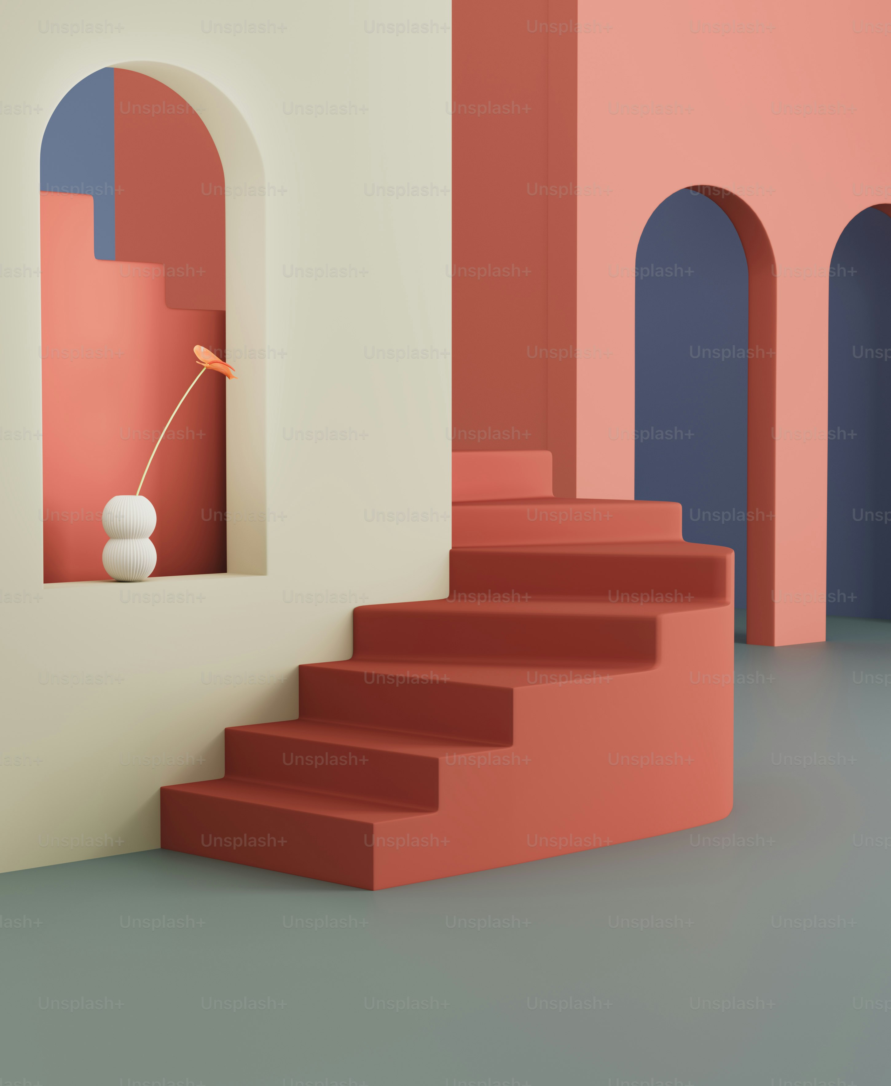 A set of stairs with a vase on top of it photo – Staircase Image on ...