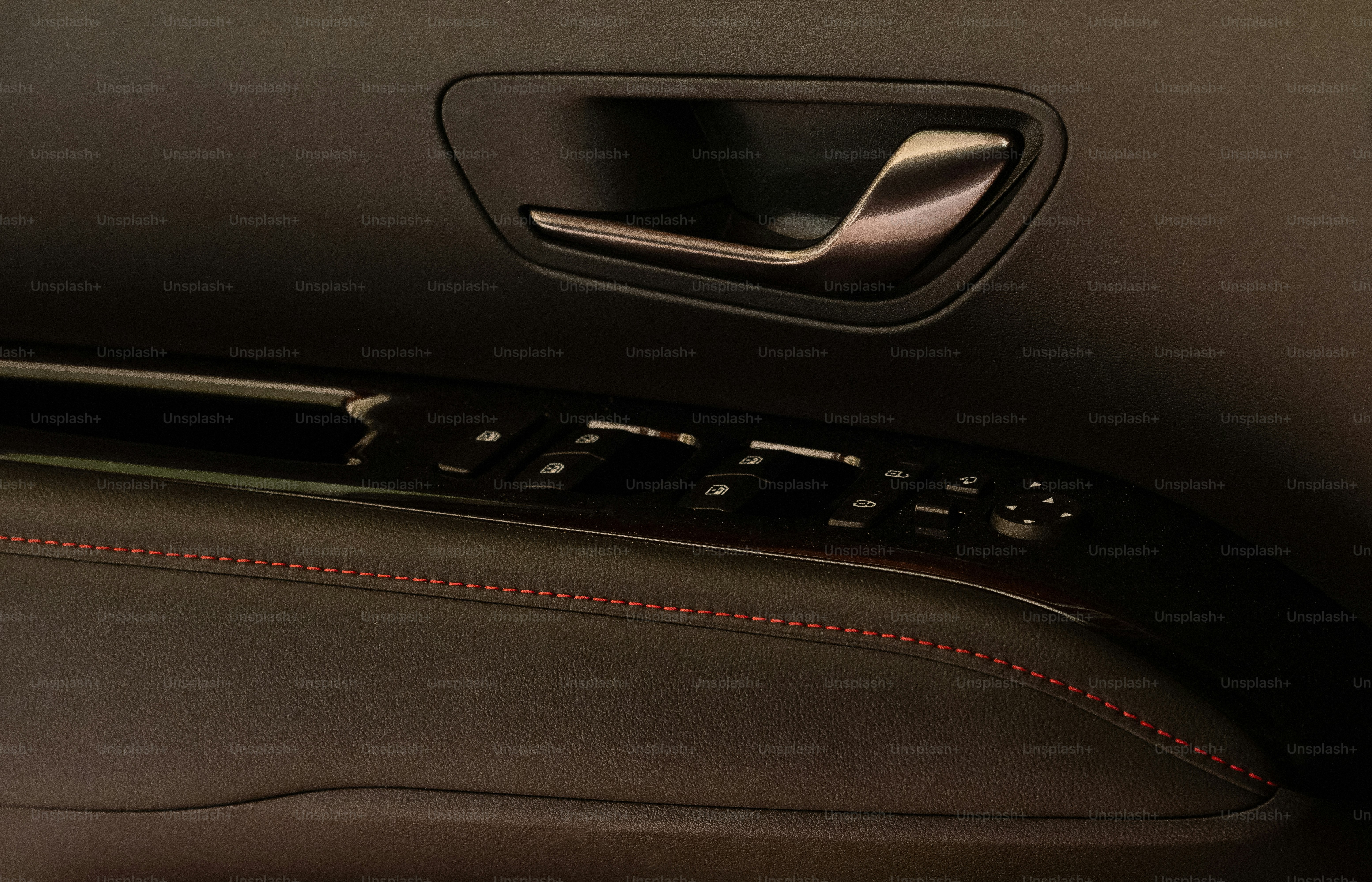 A close up of a door handle on a car photo – Car interior Image on Unsplash