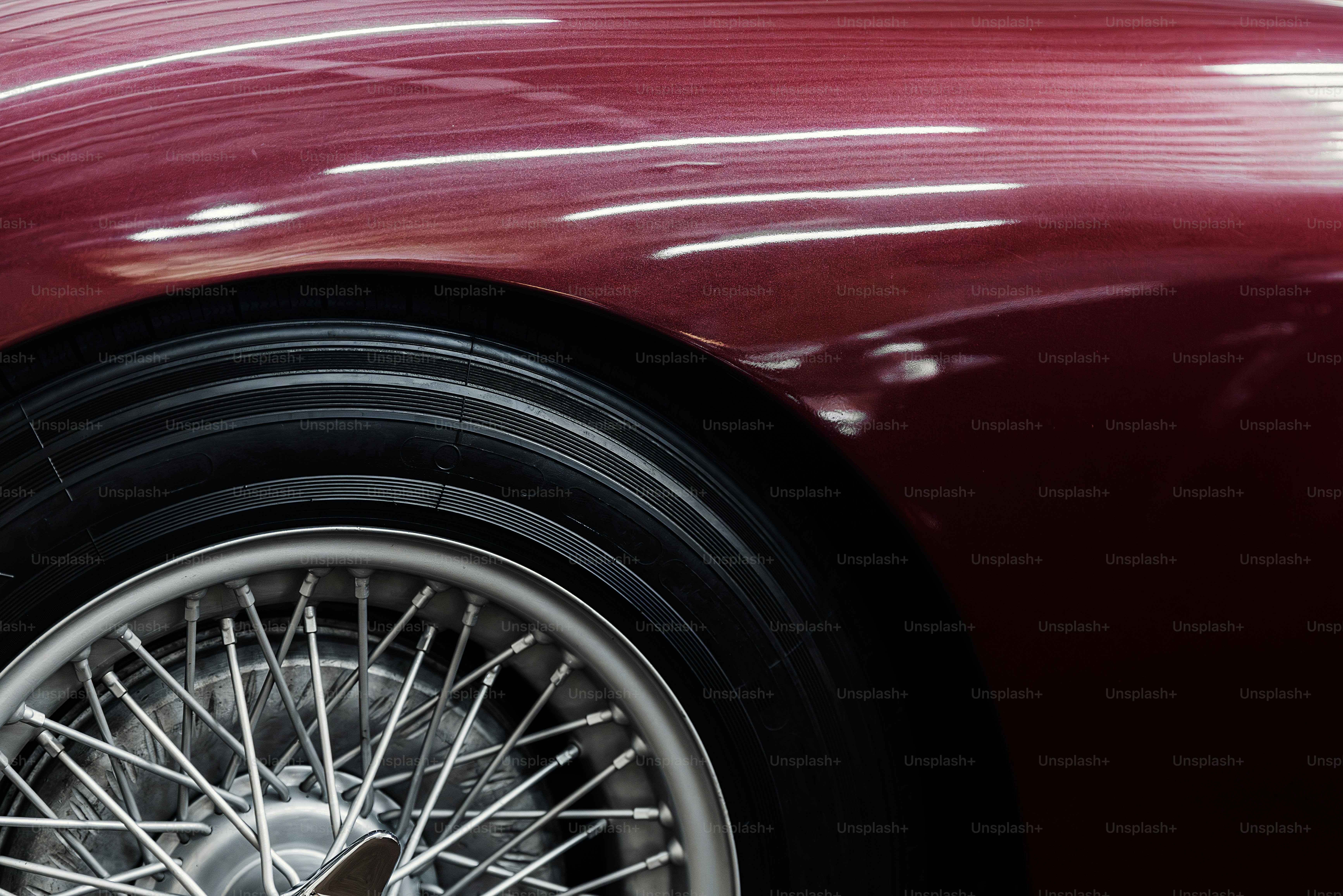 A close up of a white car with a red light photo – Car detail Image on ...