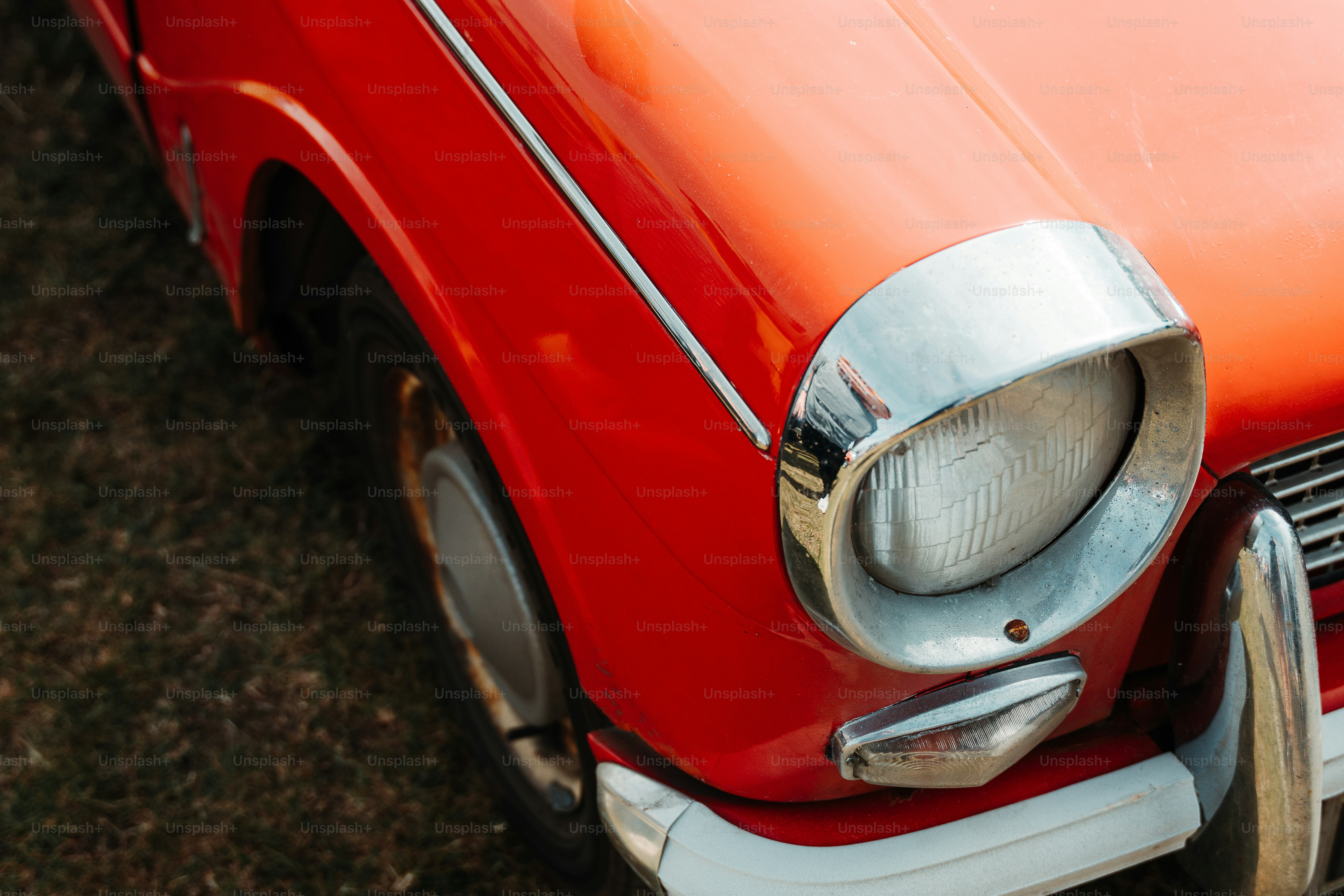 A close up of a red and white car tire photo – Car Image on Unsplash