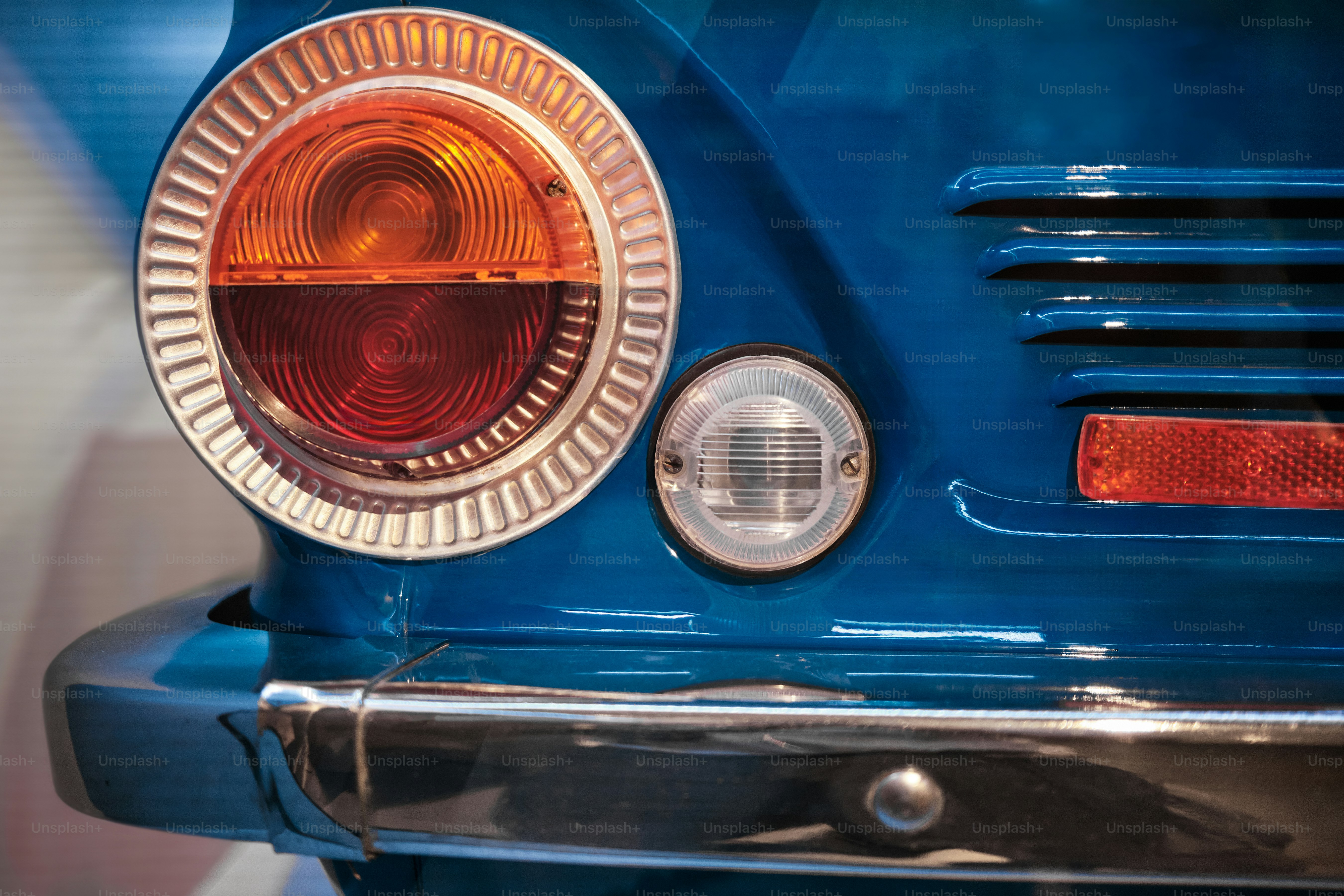 A close up of the front of a blue car photo – Automobile Image on Unsplash