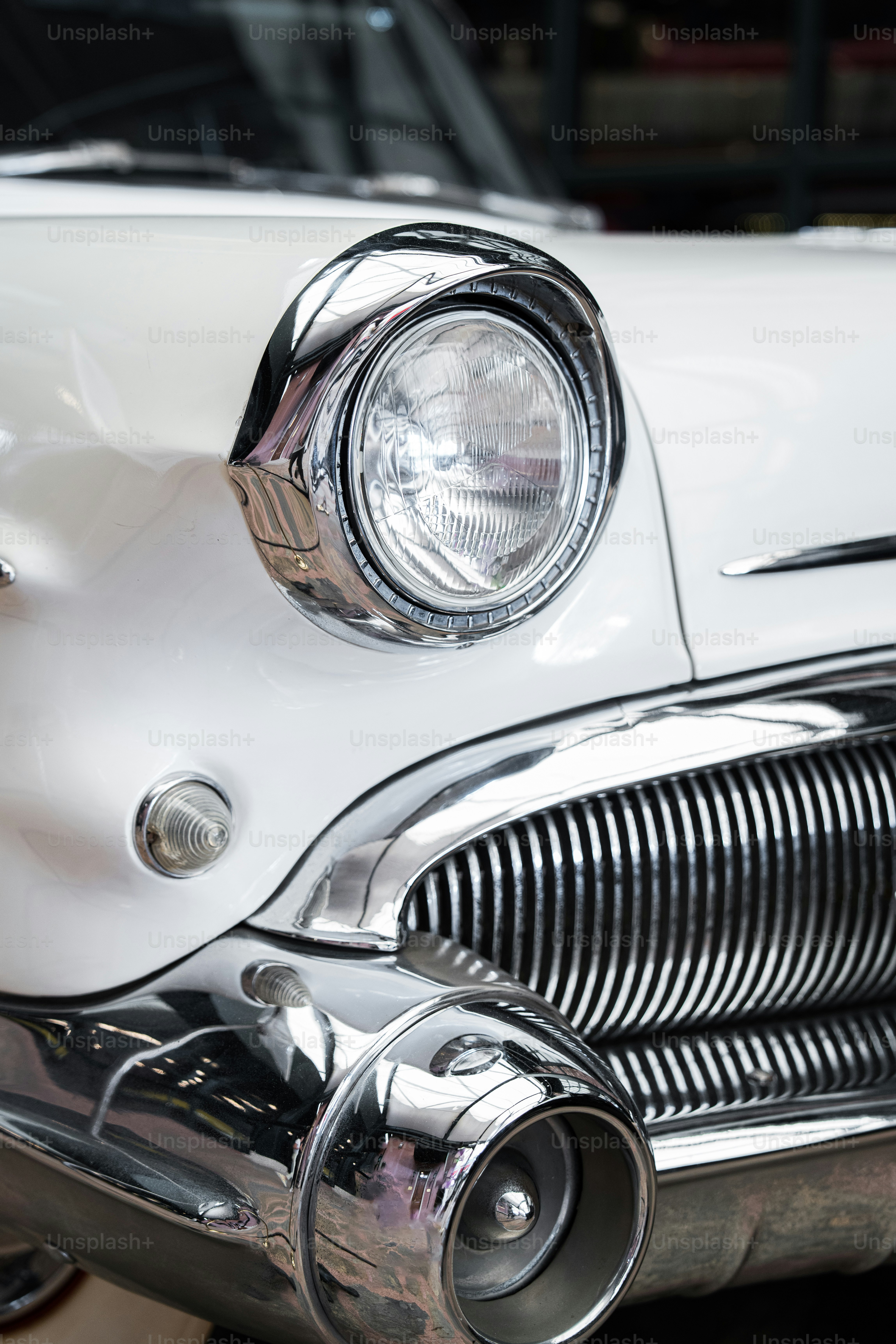 A close up of the front end of a classic car photo – Car Image on Unsplash