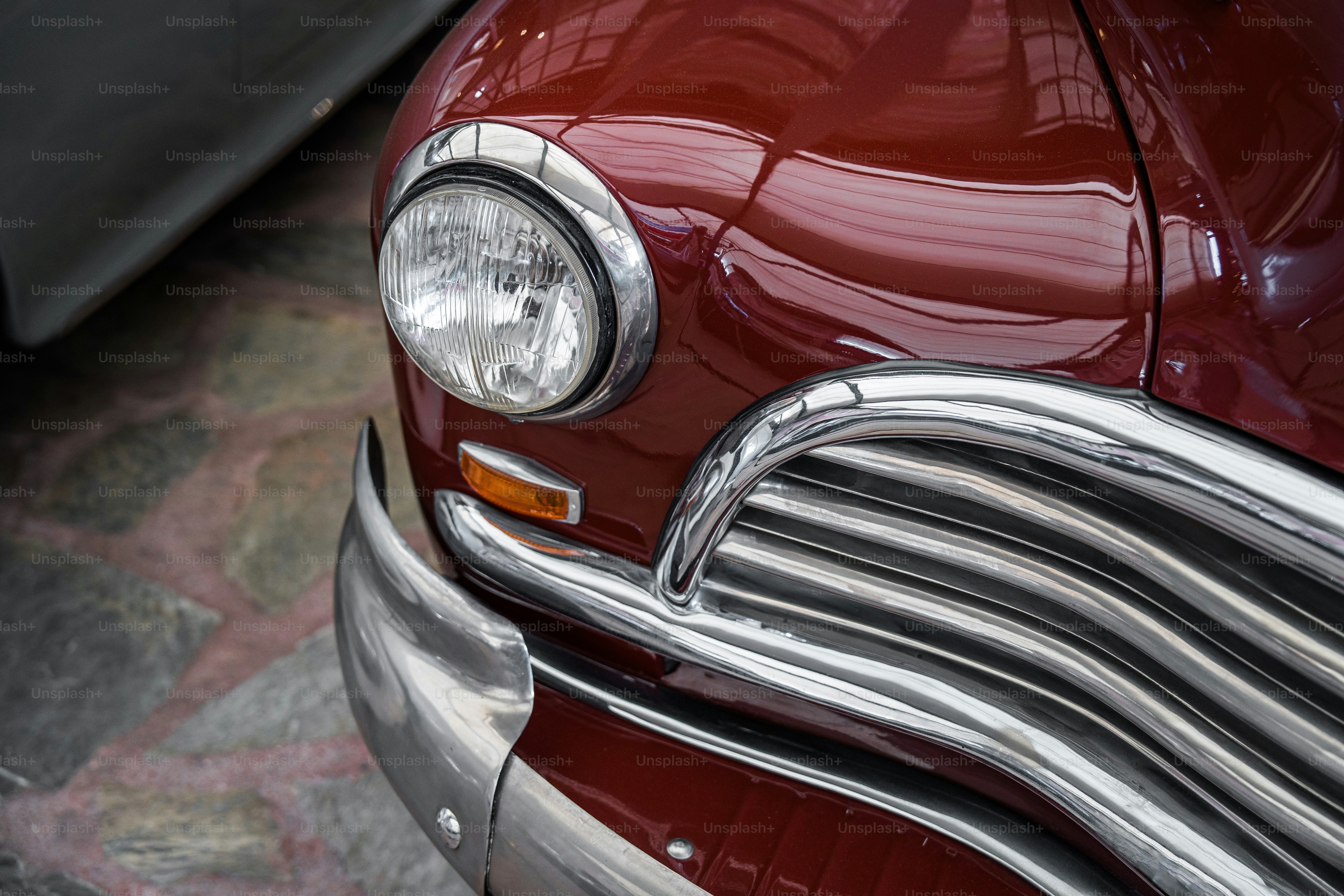 A close up of the front end of a classic car photo – Car Image on Unsplash