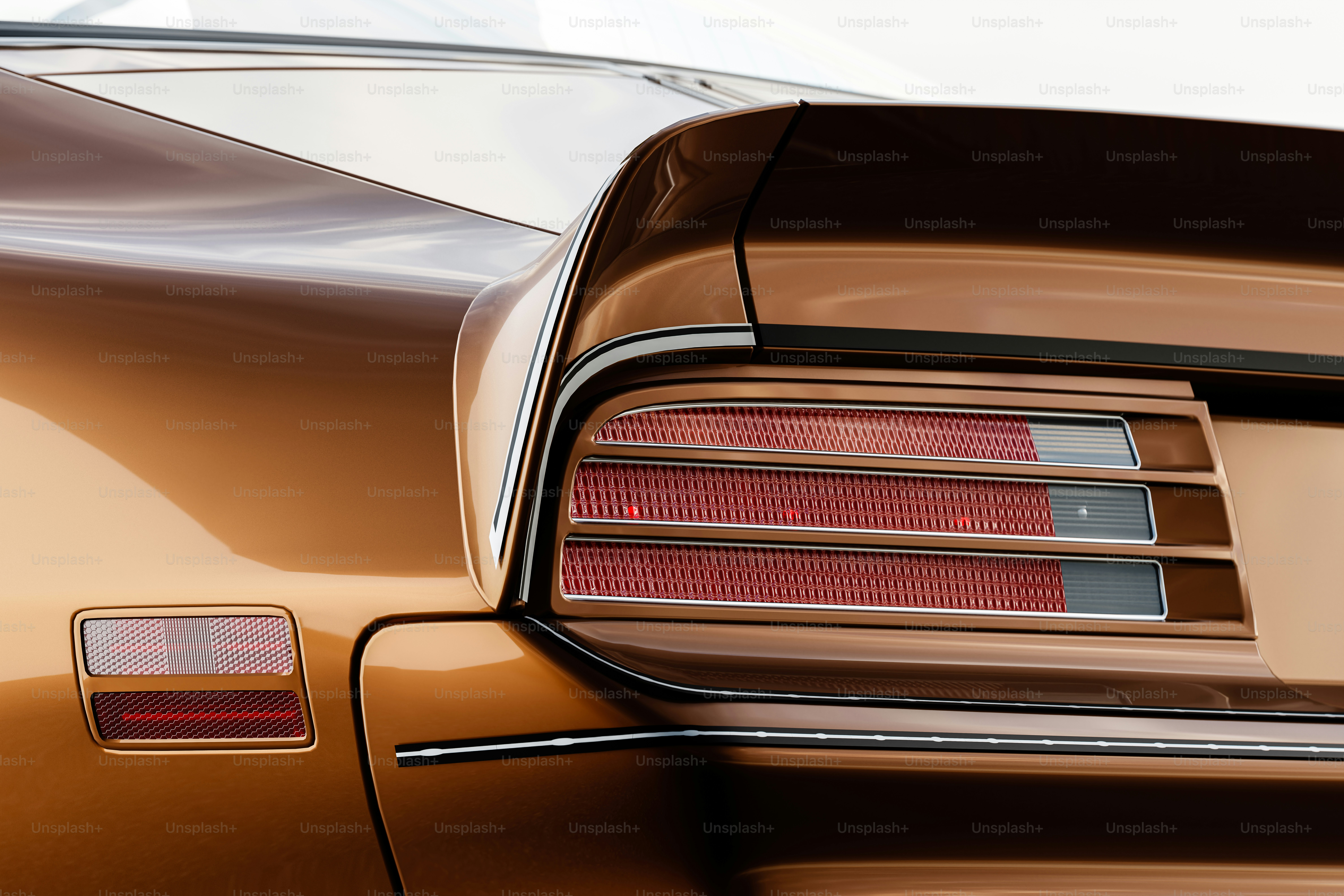 The rear end of a brown sports car photo – Backgrounds Image on Unsplash