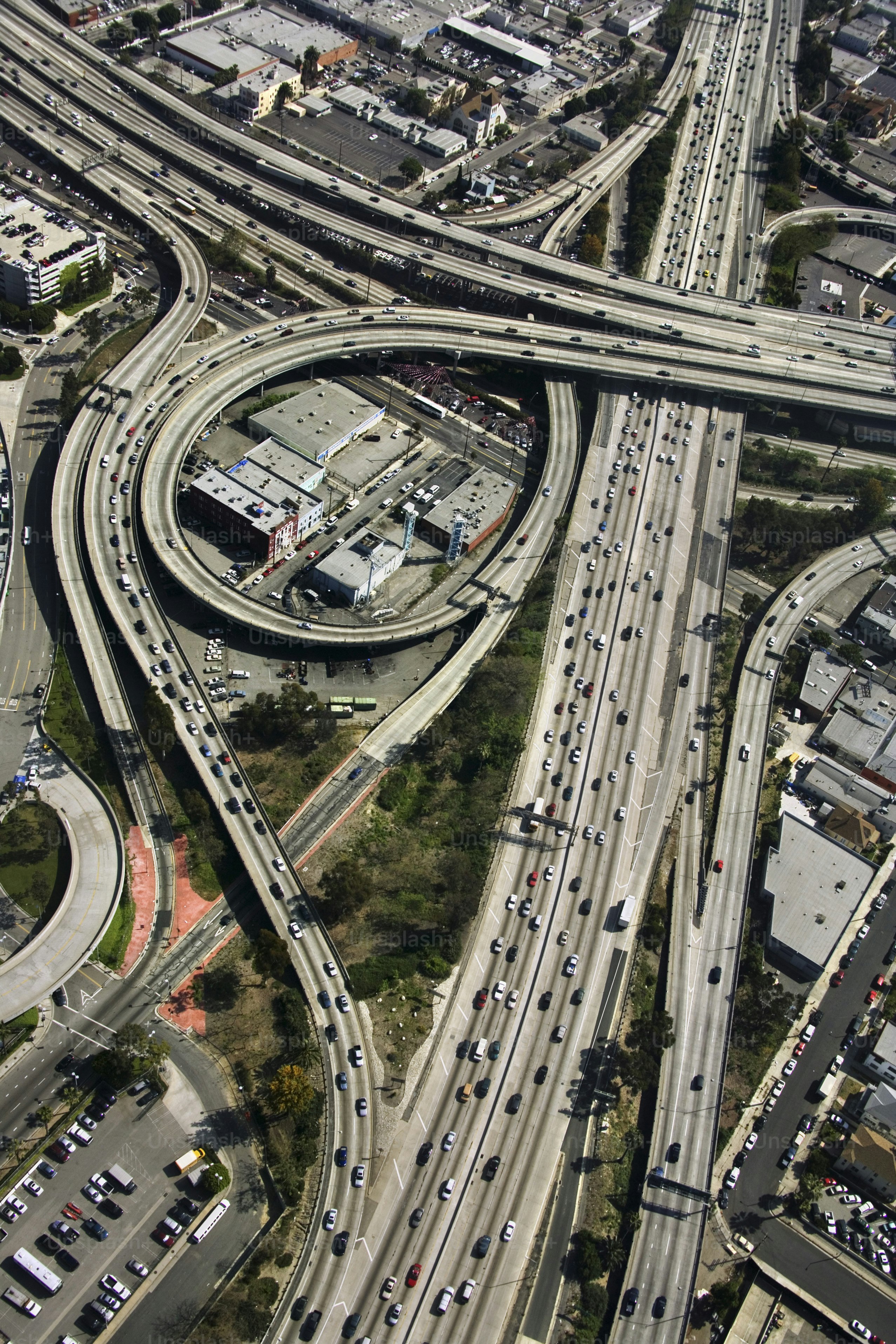An aerial view of a highway intersection with multiple lanes photo ...