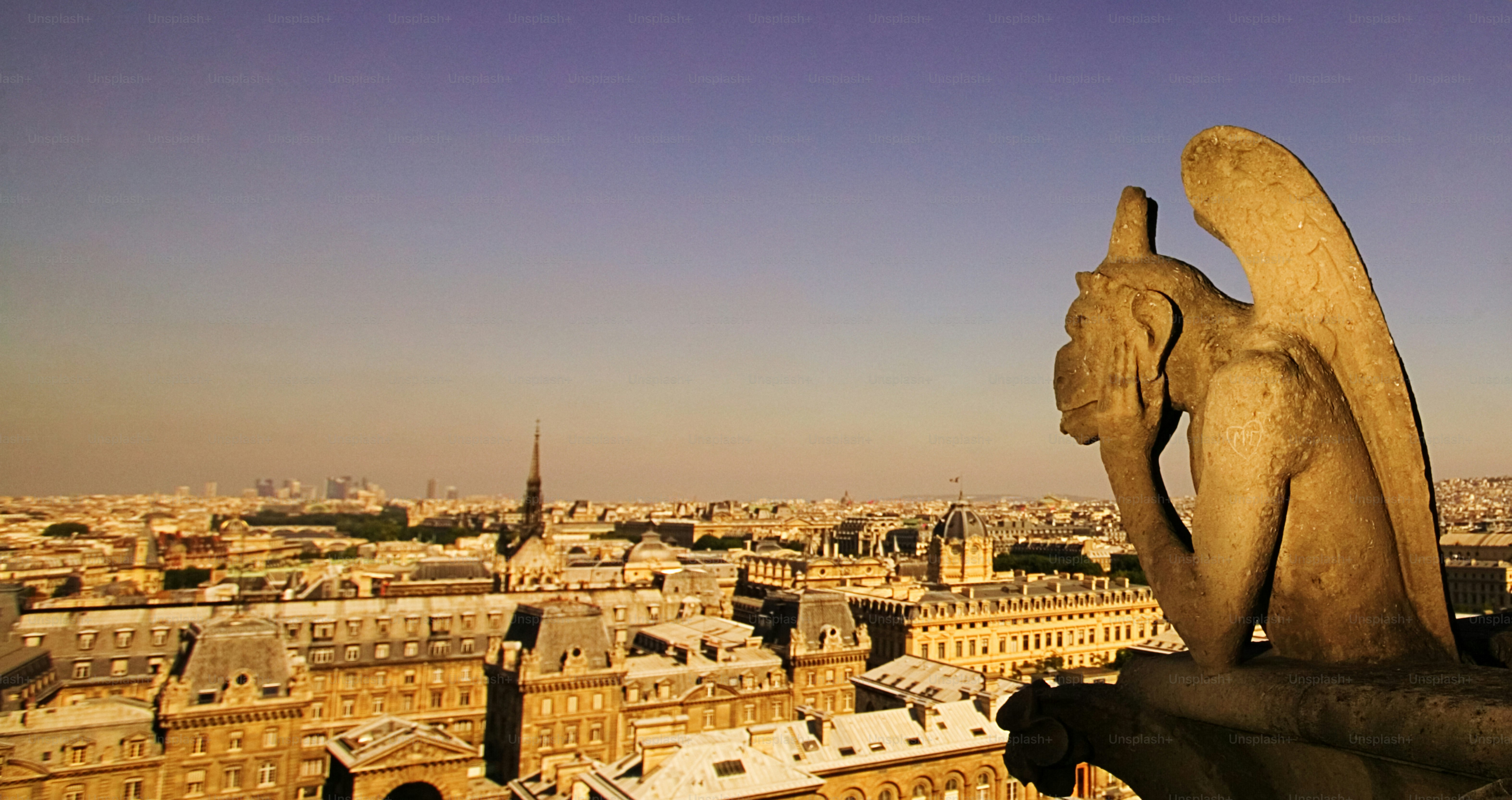 A statue of an angel on top of a building photo – No people Image on ...