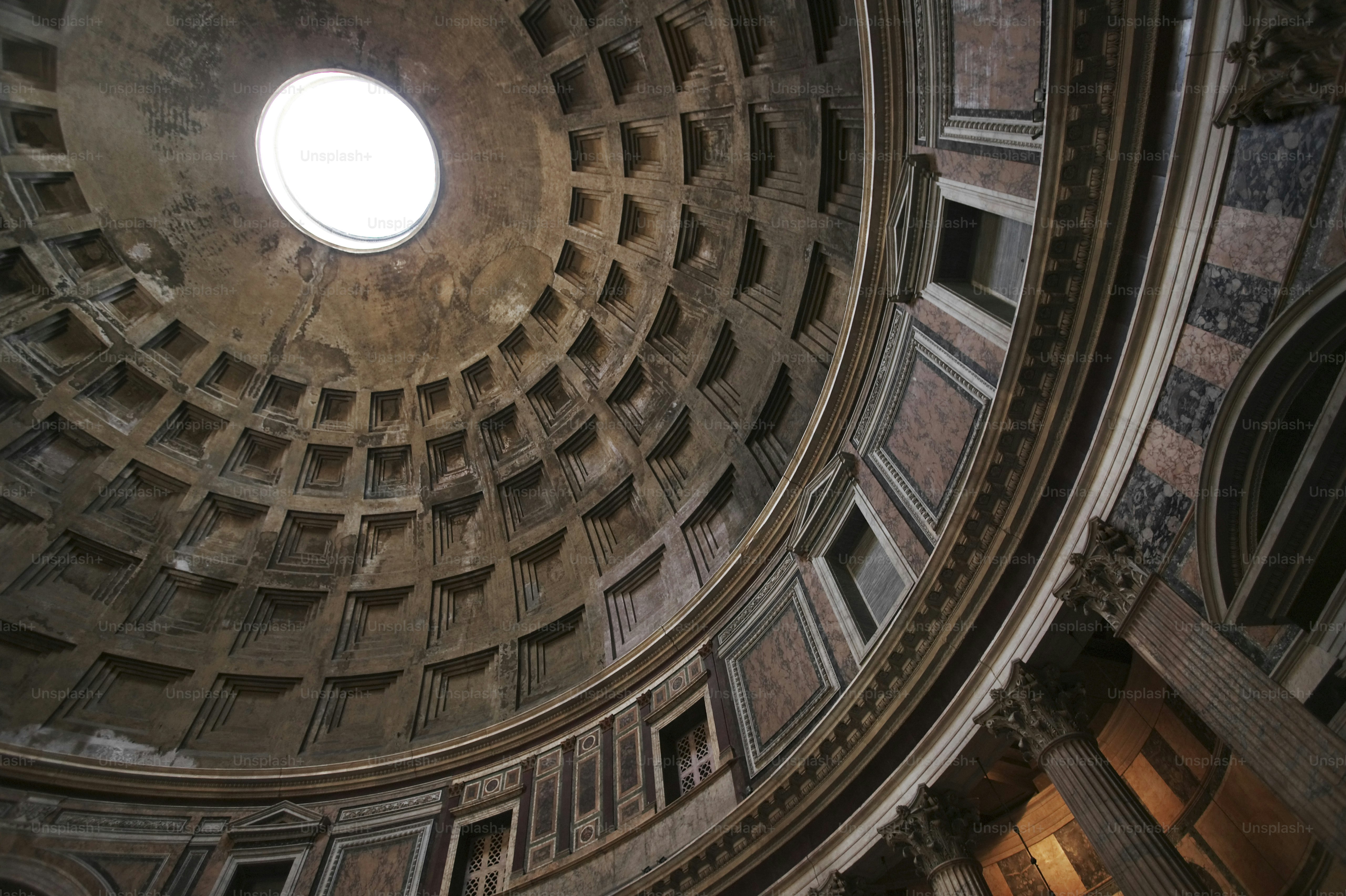 A round window in the ceiling of a building photo – International ...