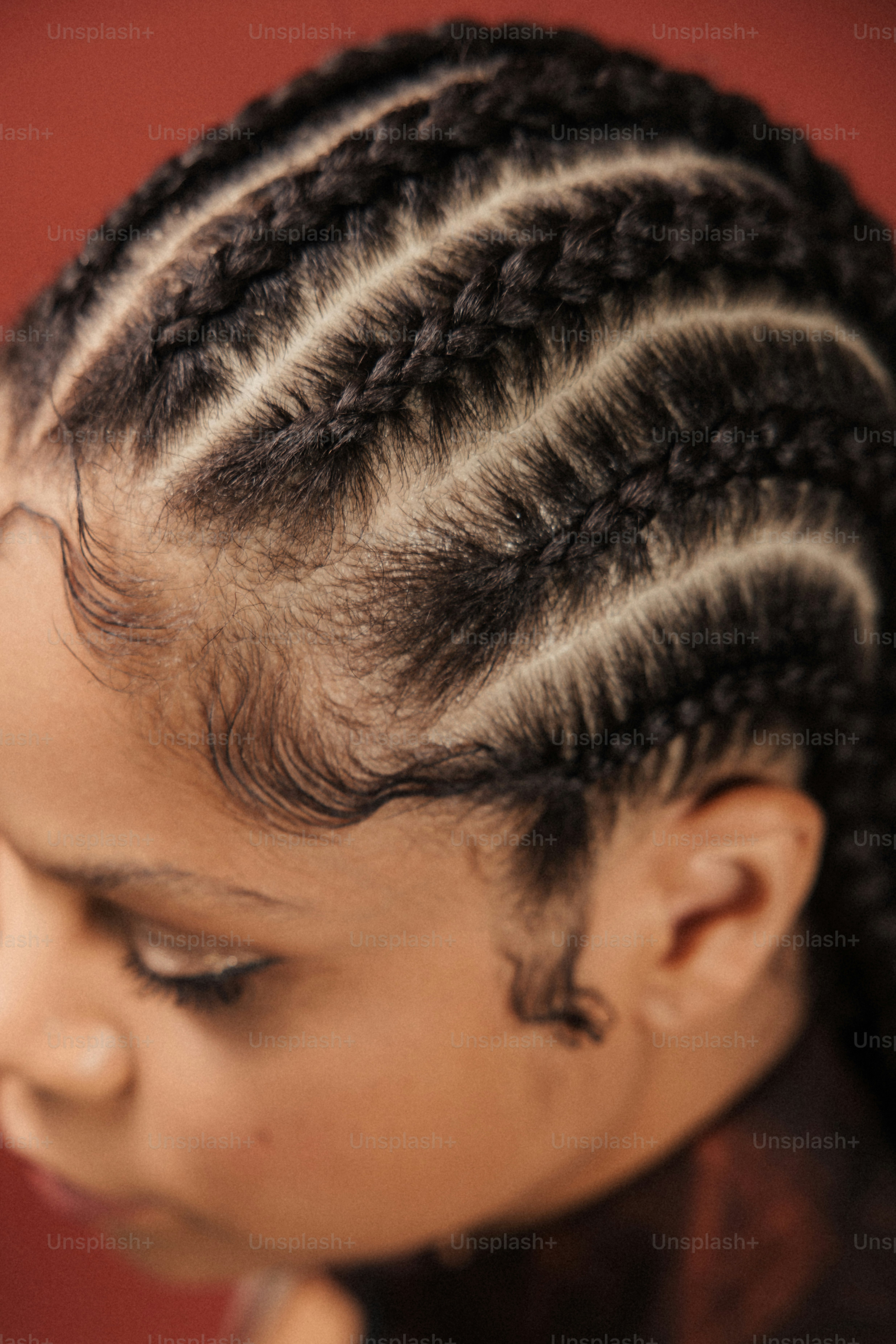 A little girl with braids on her hair photo – Beauty Image on Unsplash
