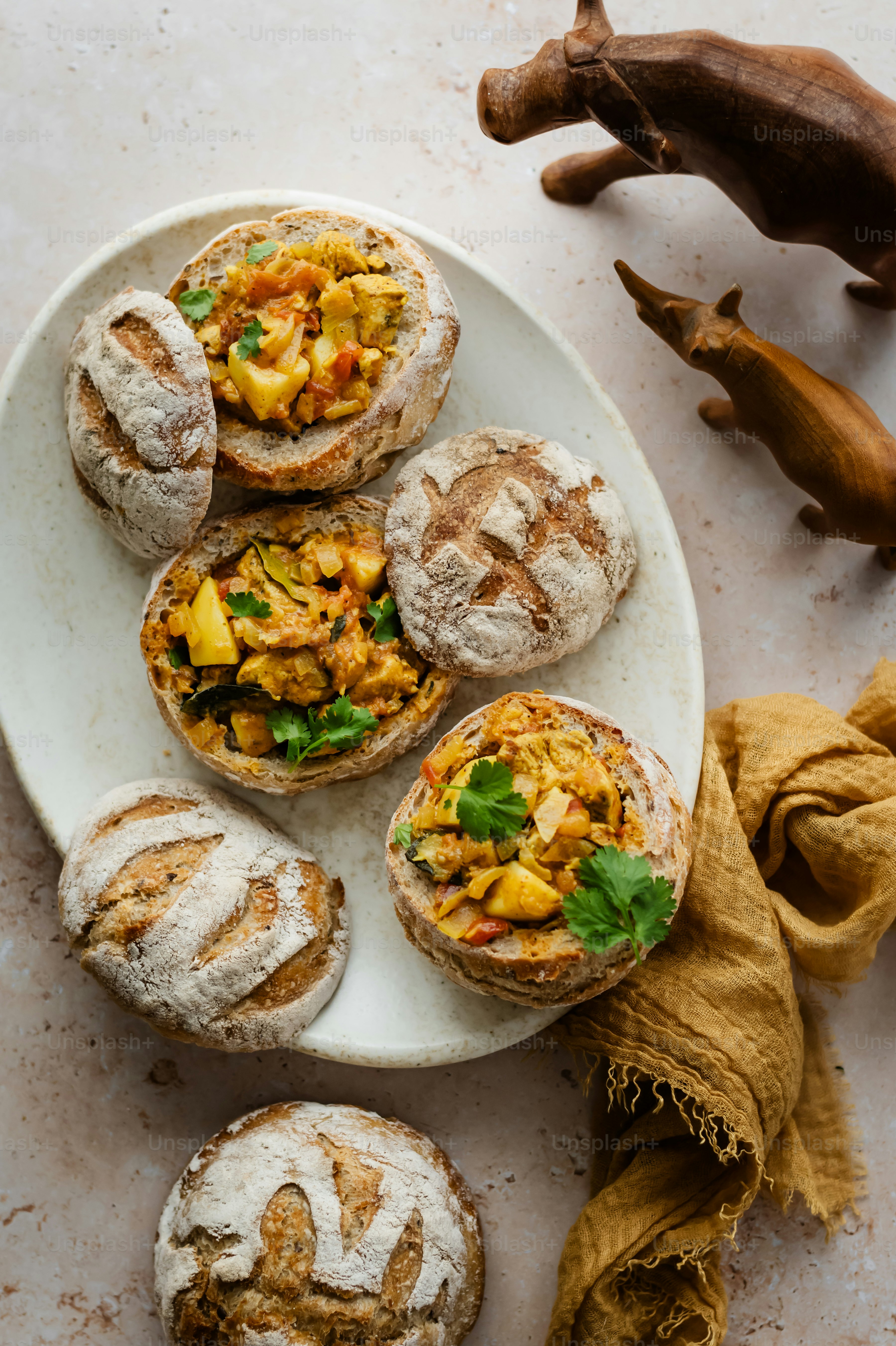 A white plate topped with pastries covered in toppings photo – Food ...