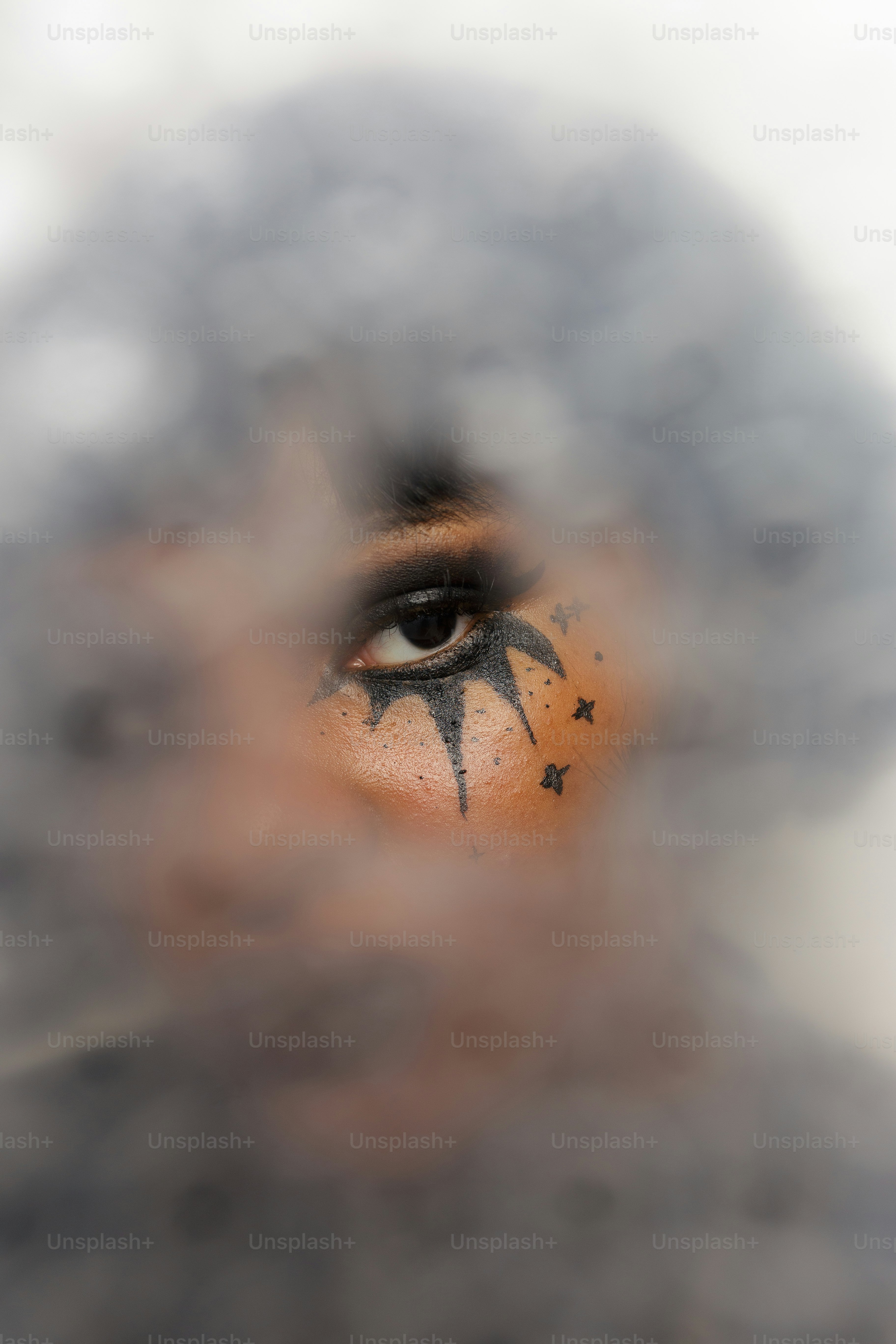 A close up of a person's face through a window photo – Halloween ...
