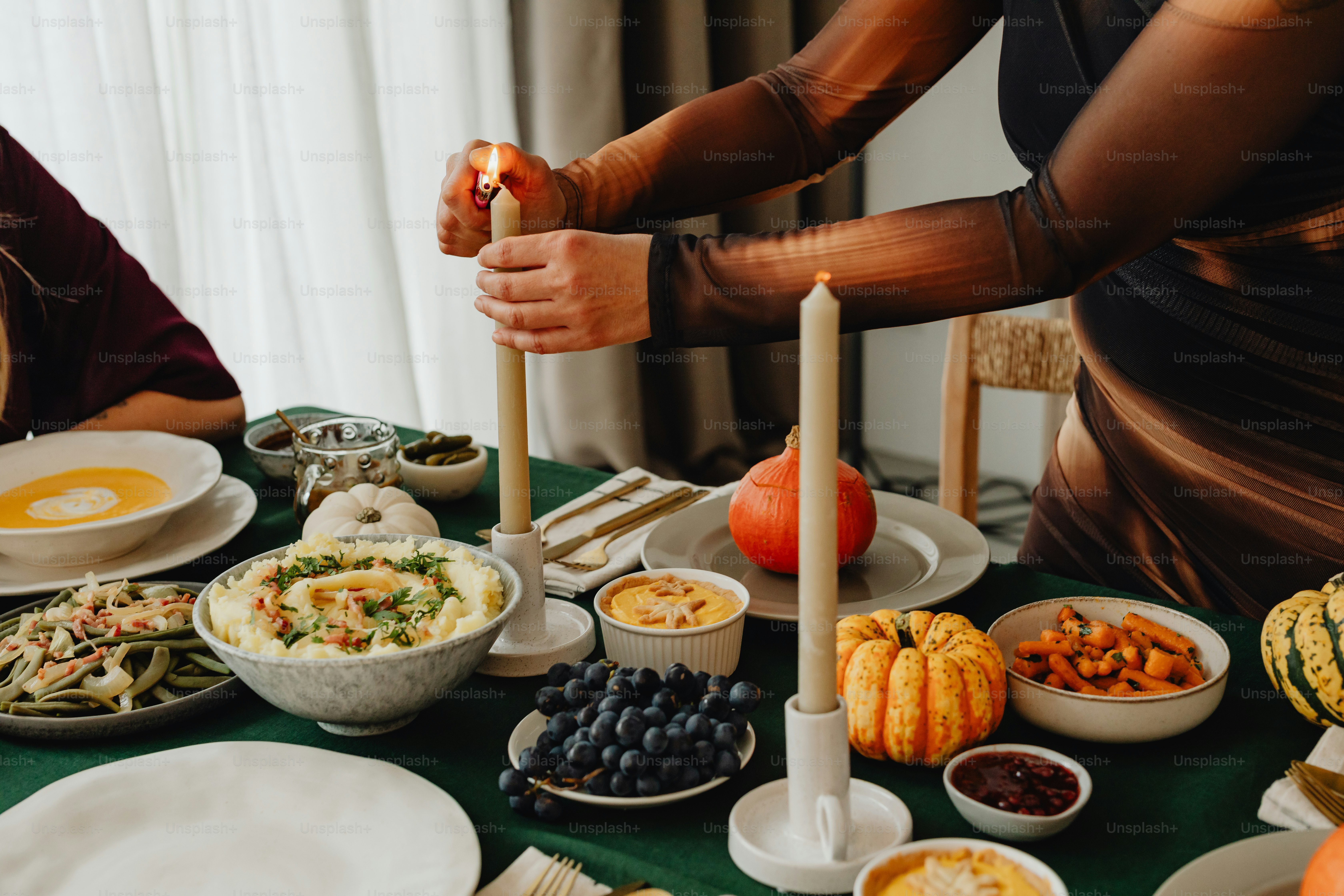 A table filled with plates and bowls of food photo – Thanksgiving Image ...