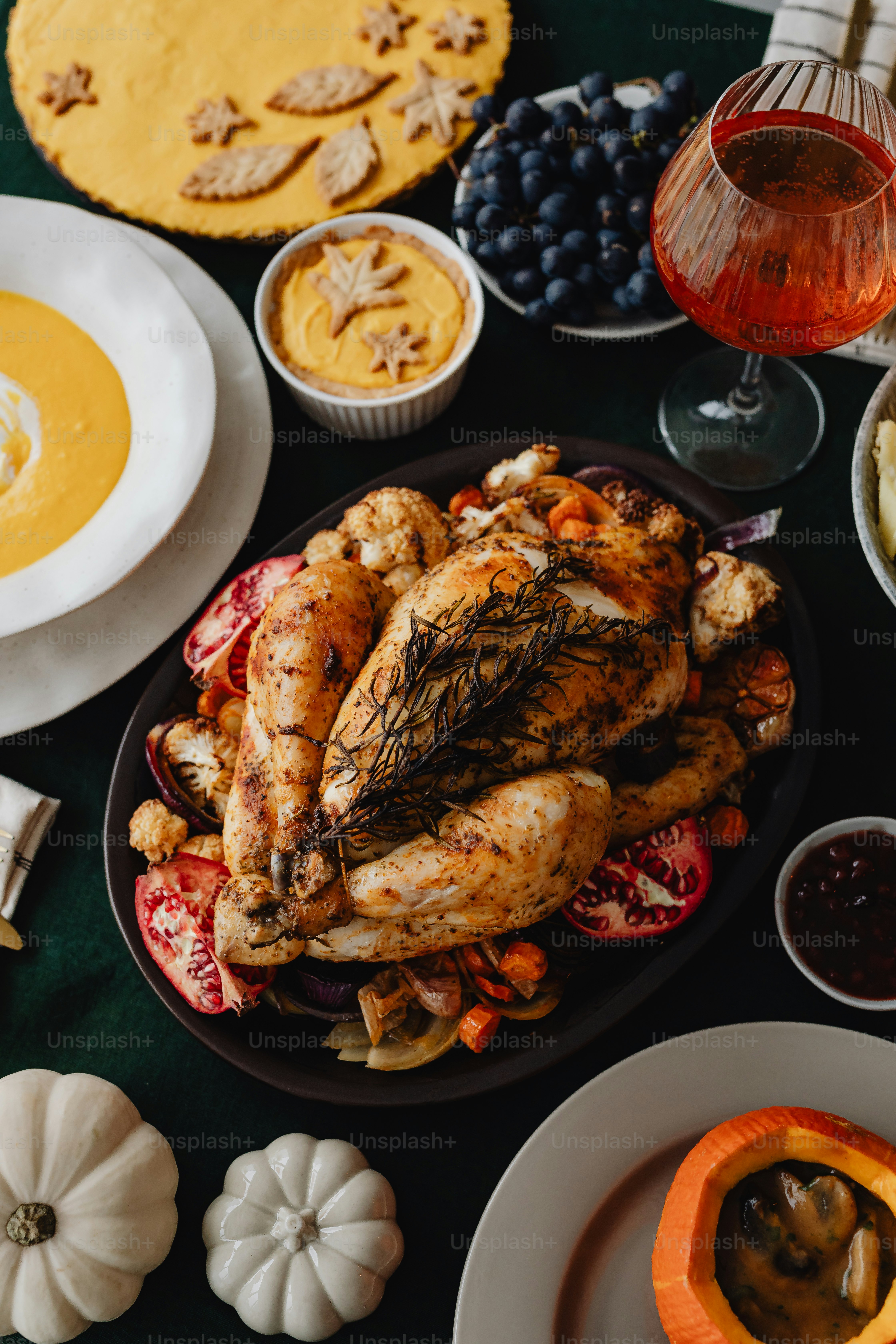 A table filled with plates and bowls of food photo – Thanksgiving Image ...