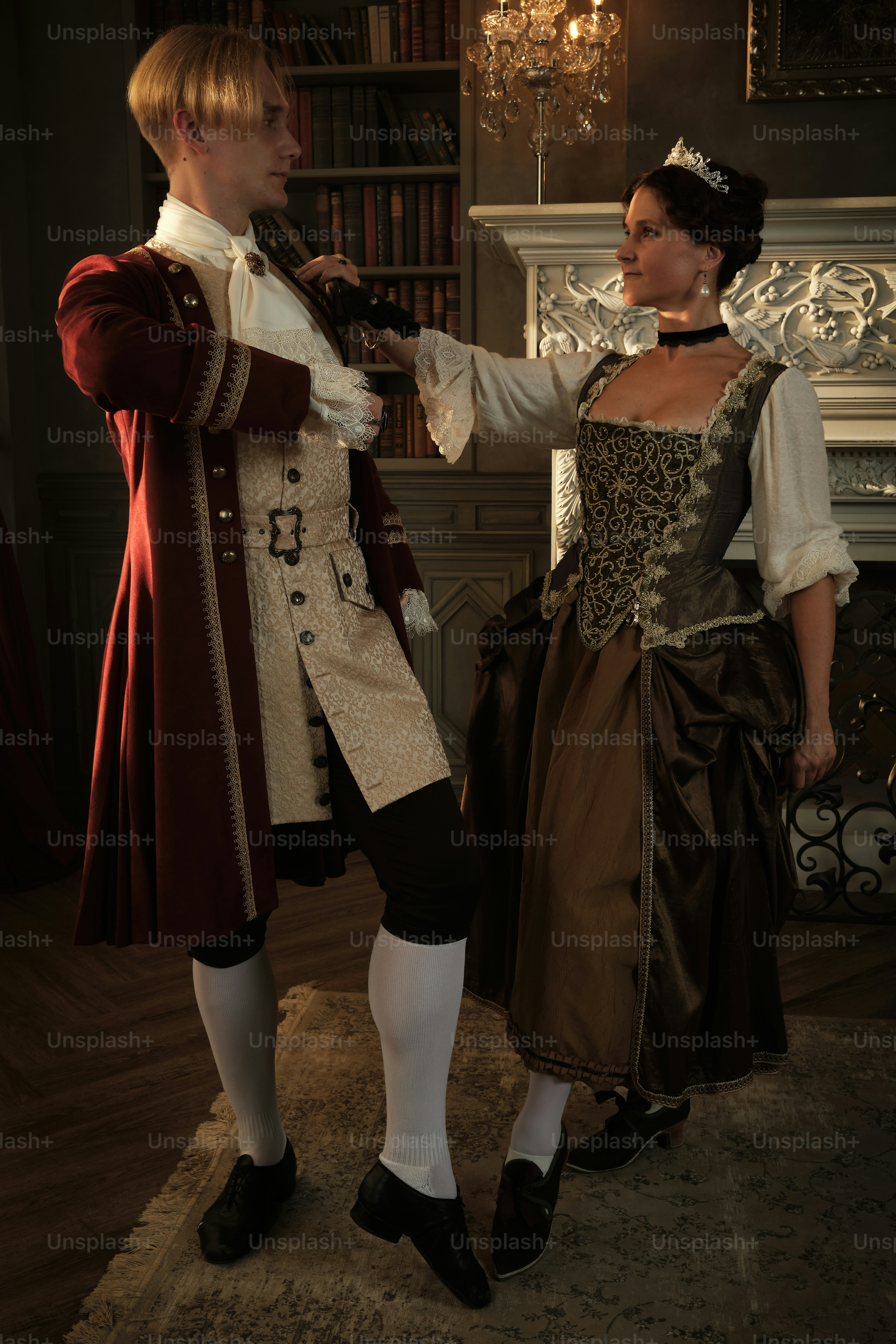 A man and a woman dressed in period costumes photo – Sword Image on ...