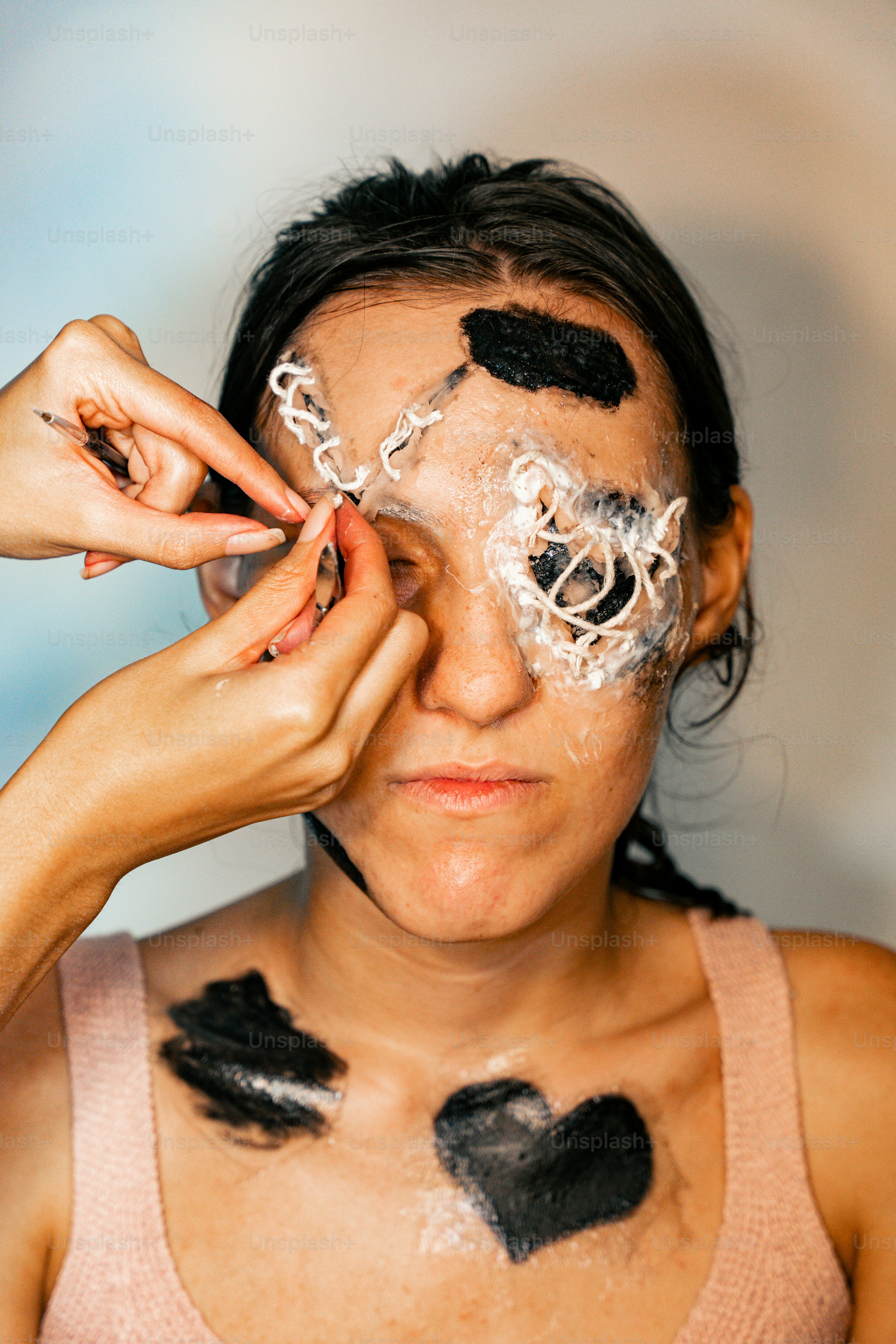 A man with a knife cutting through his face photo – Cosmetics Image on ...