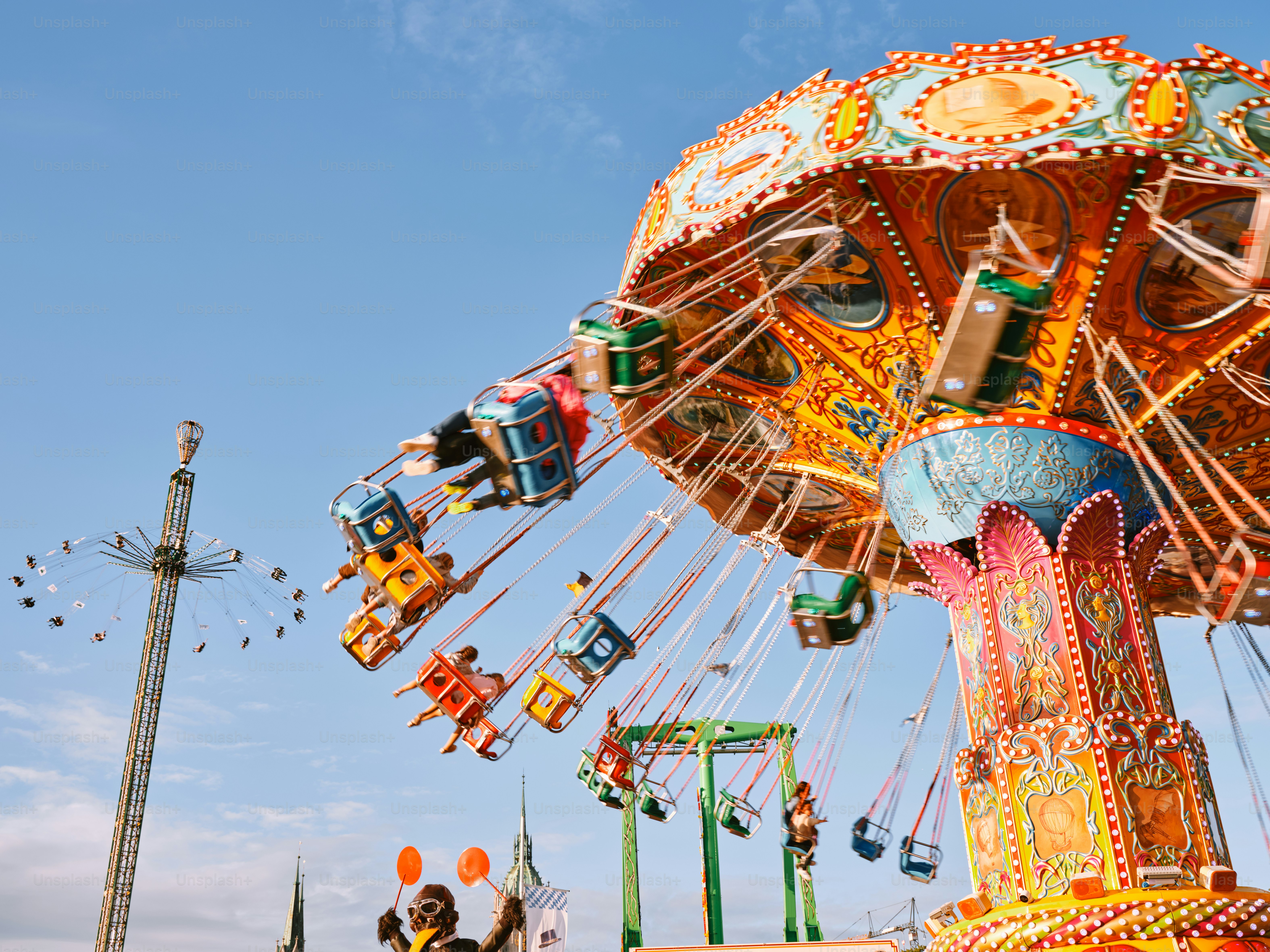 An amusement park with a ferris wheel and rides photo – Theme park ...