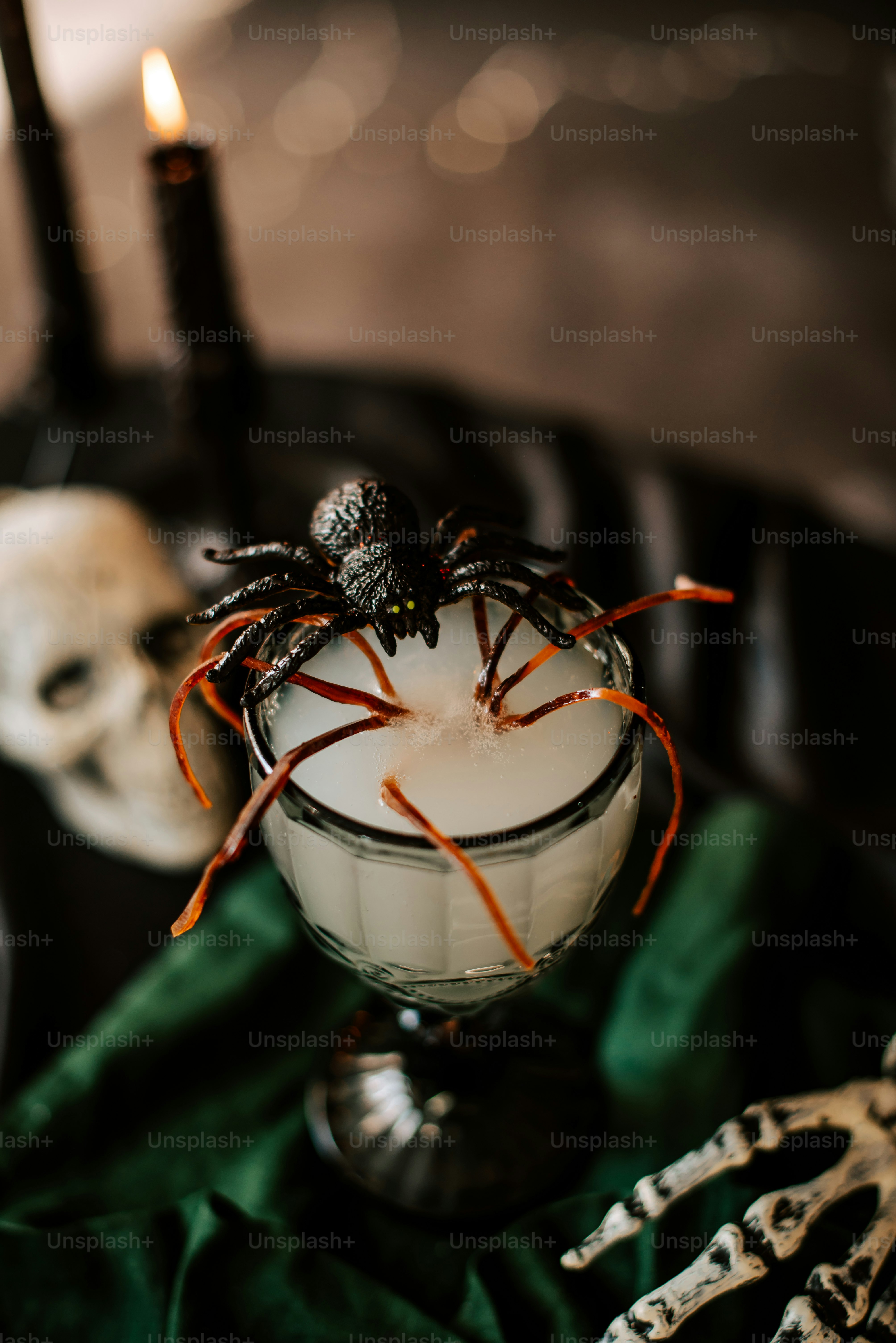 A halloween drink with a spider on top of it photo – Spider Image on ...