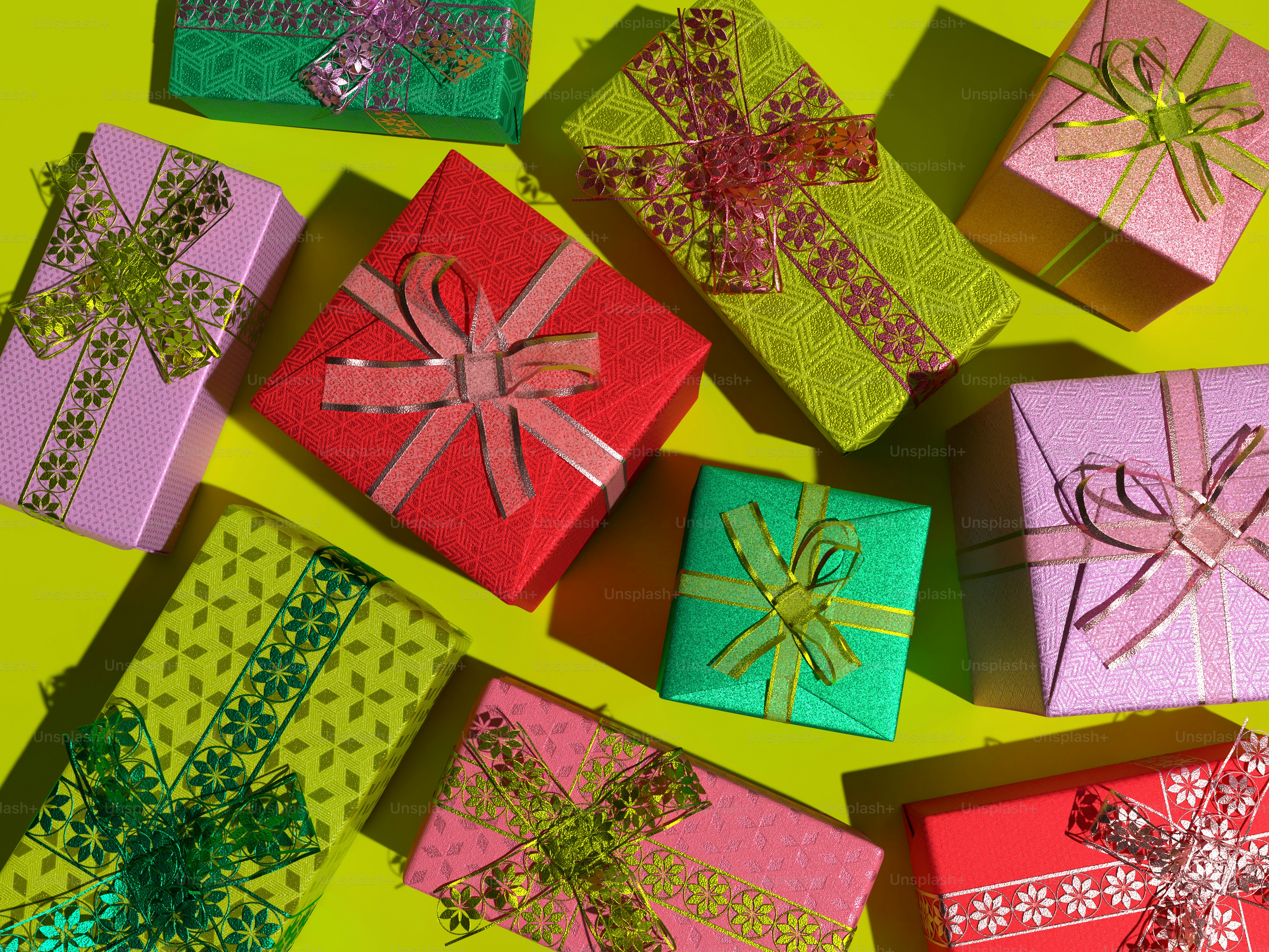 A group of wrapped presents sitting on top of a table photo – Christmas ...