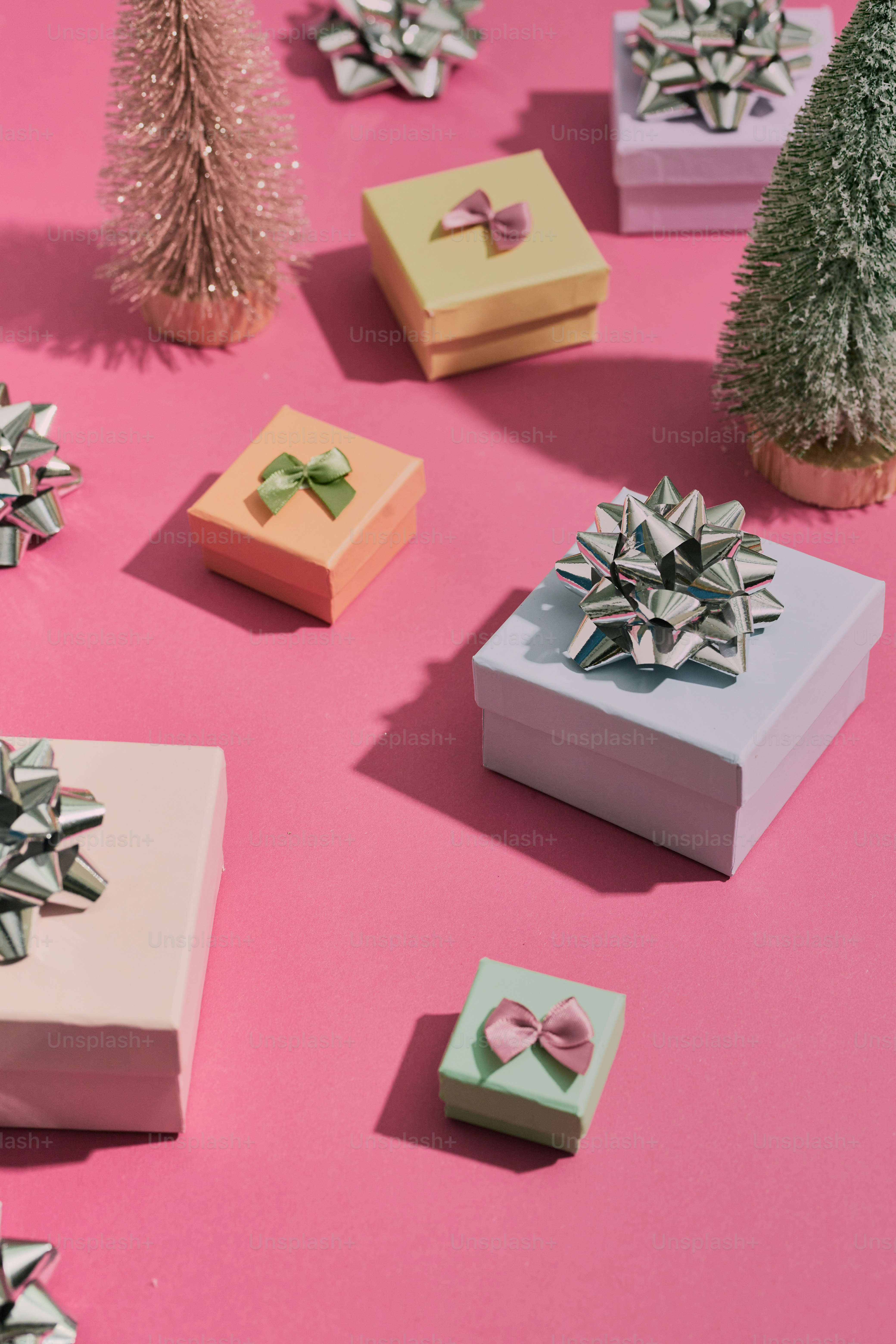 A group of small boxes with bows on them photo – Christmas Image on ...