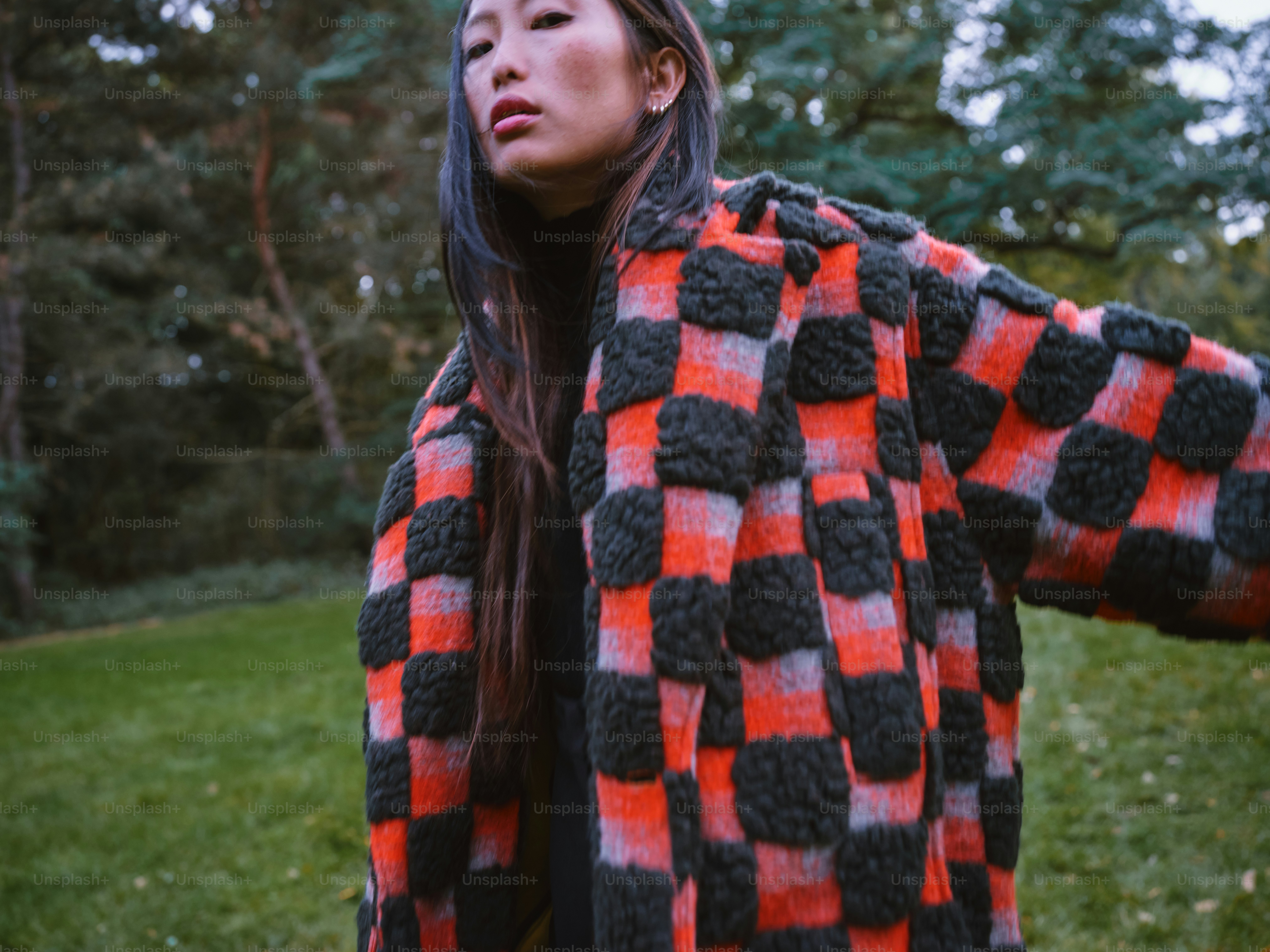A woman in a red and black checkered coat photo – Forest Image on Unsplash
