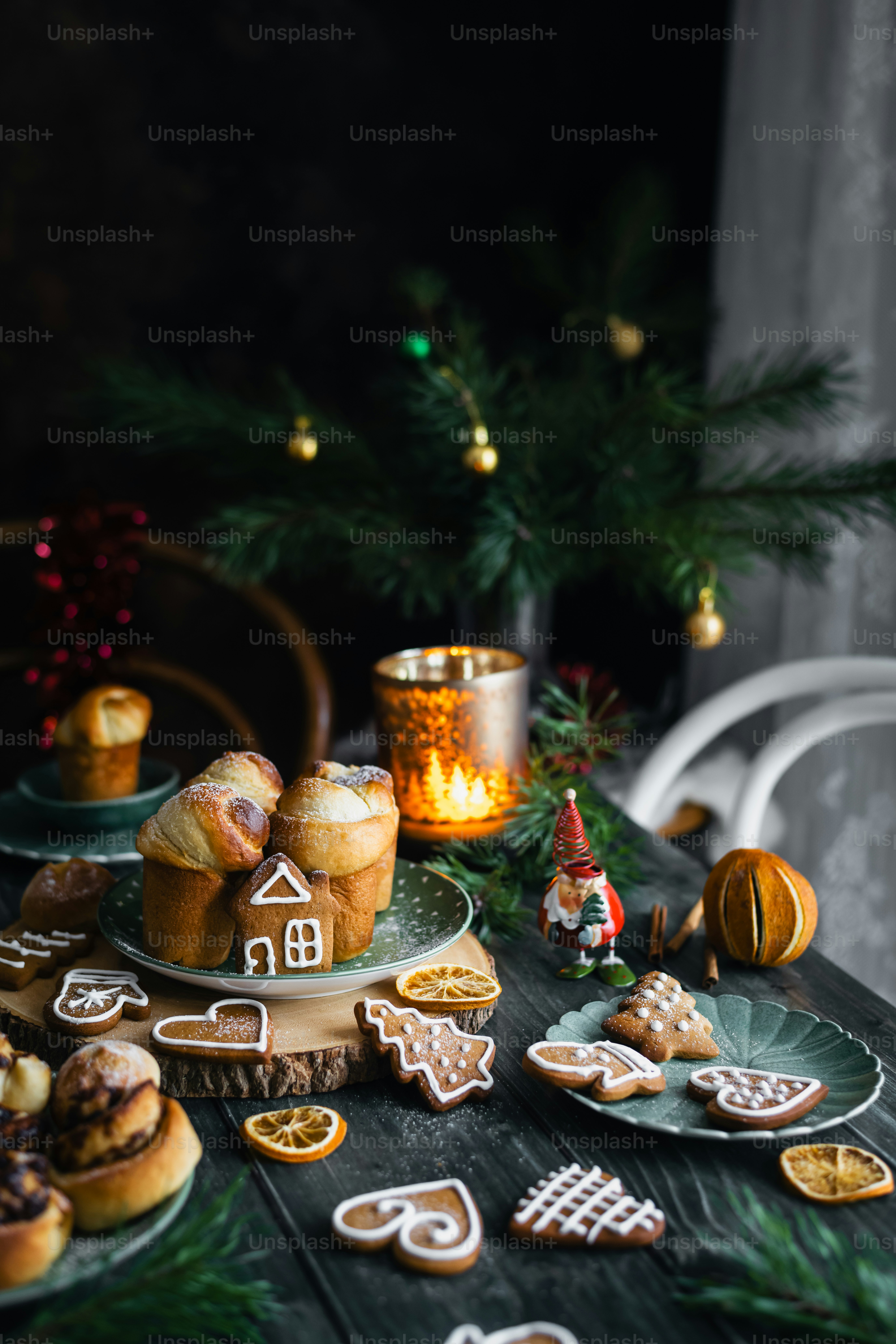 A table topped with lots of cookies and pastries photo – Christmas ...