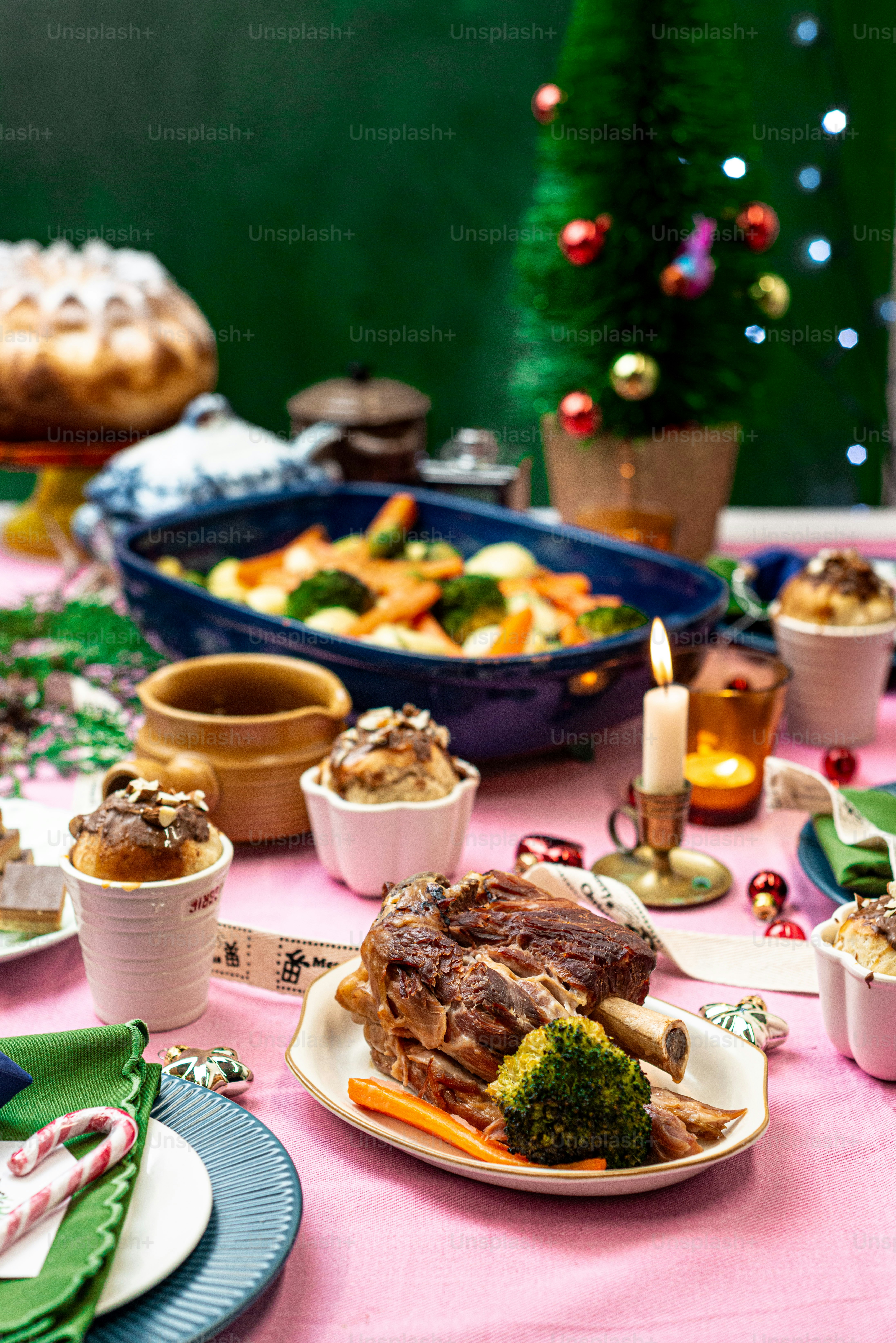 A table is set for a christmas dinner photo – Christmas roast Image on ...