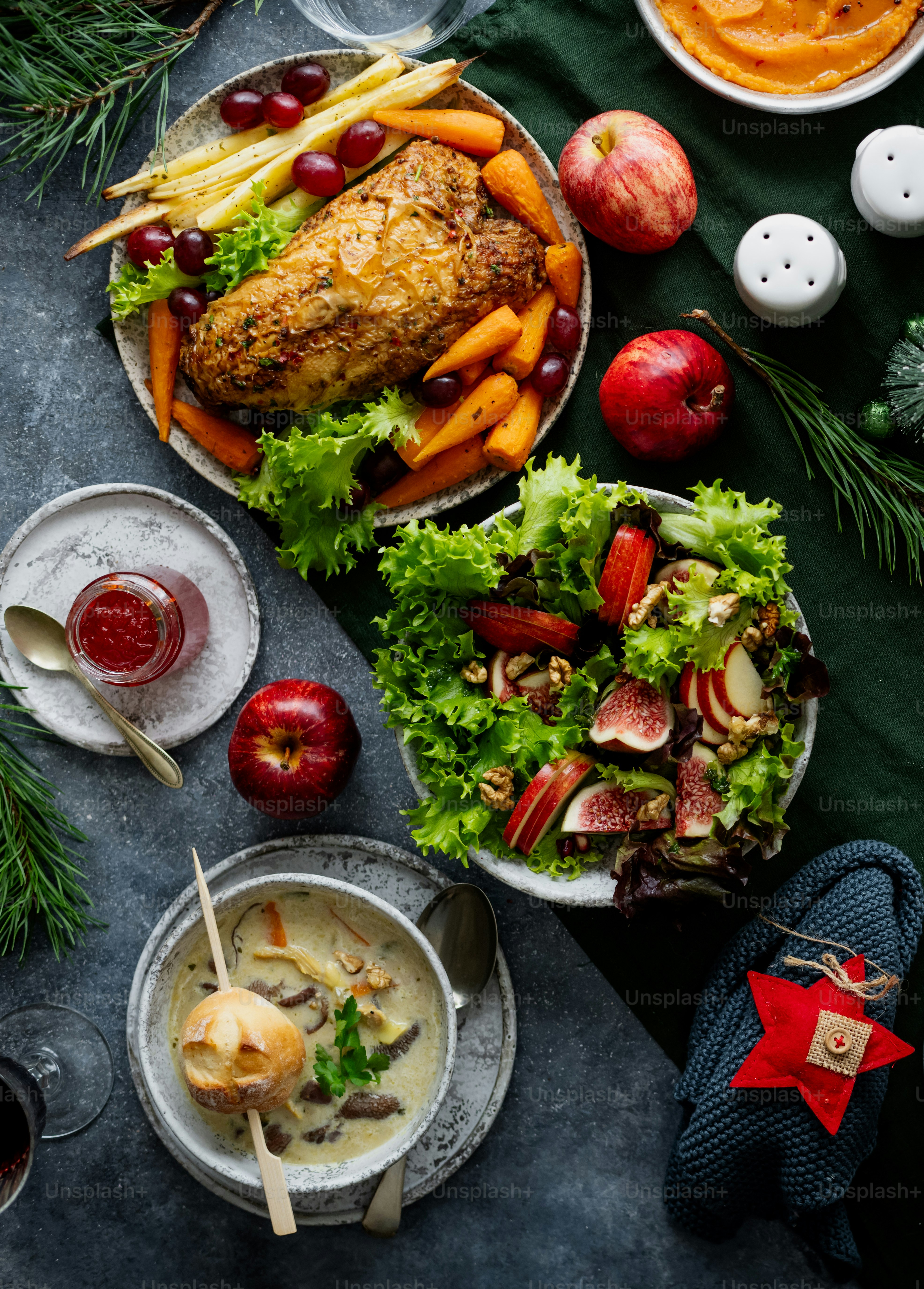 A wooden table topped with bowls of food photo – Roast dinner Image on ...