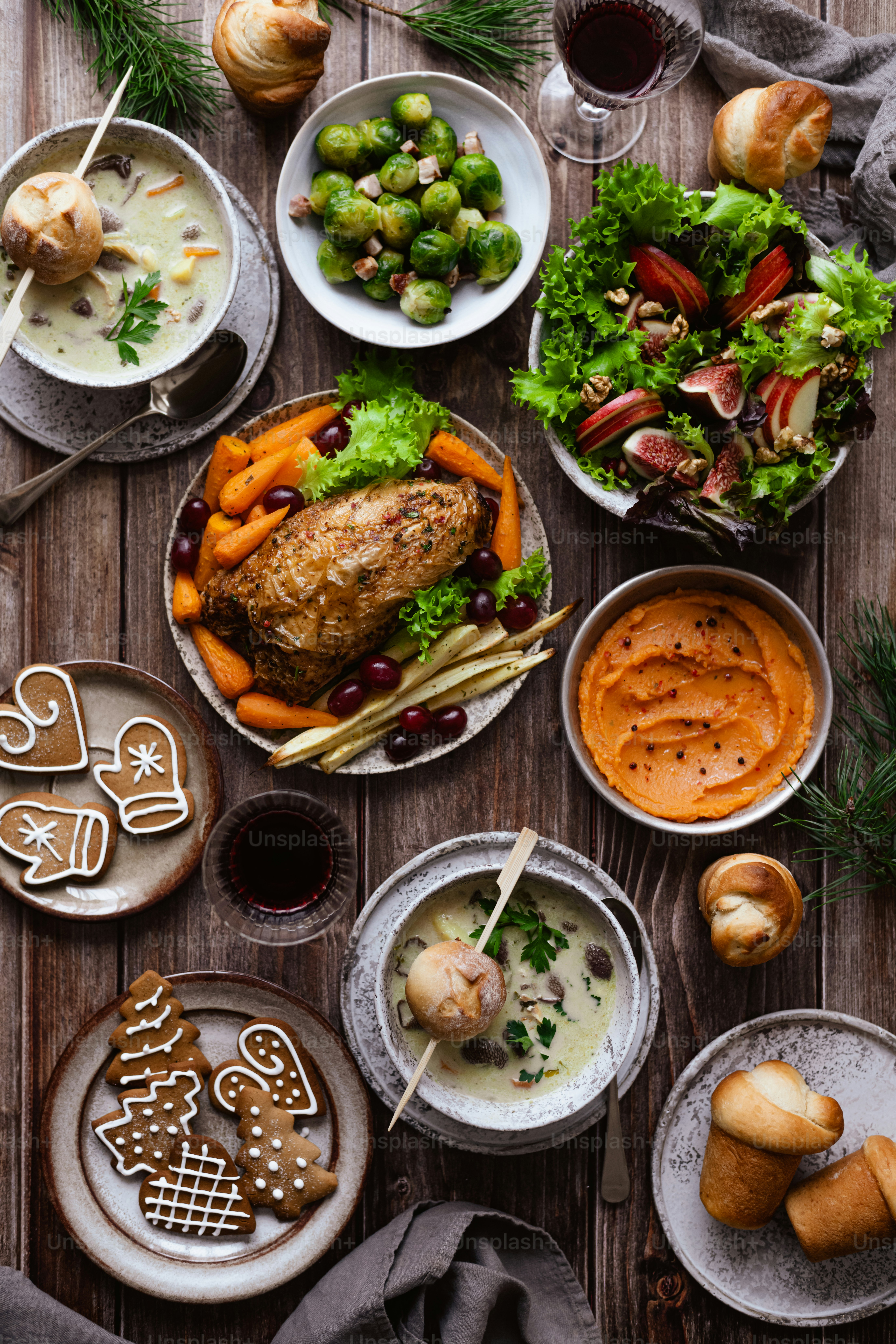 A wooden table topped with bowls of food photo – Roast dinner Image on ...