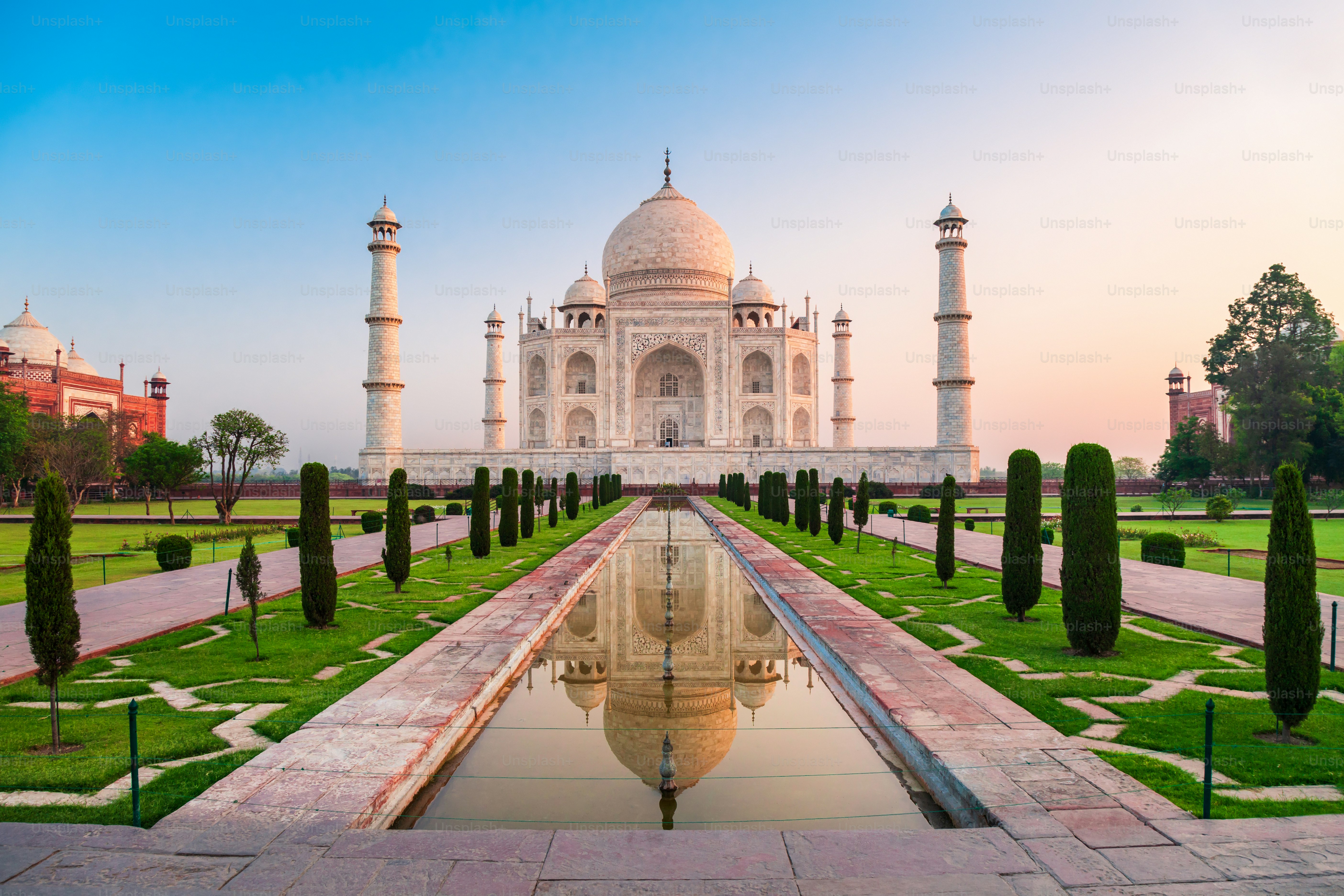 Taj Mahal is a white marble mausoleum on the bank of the Yamuna river ...