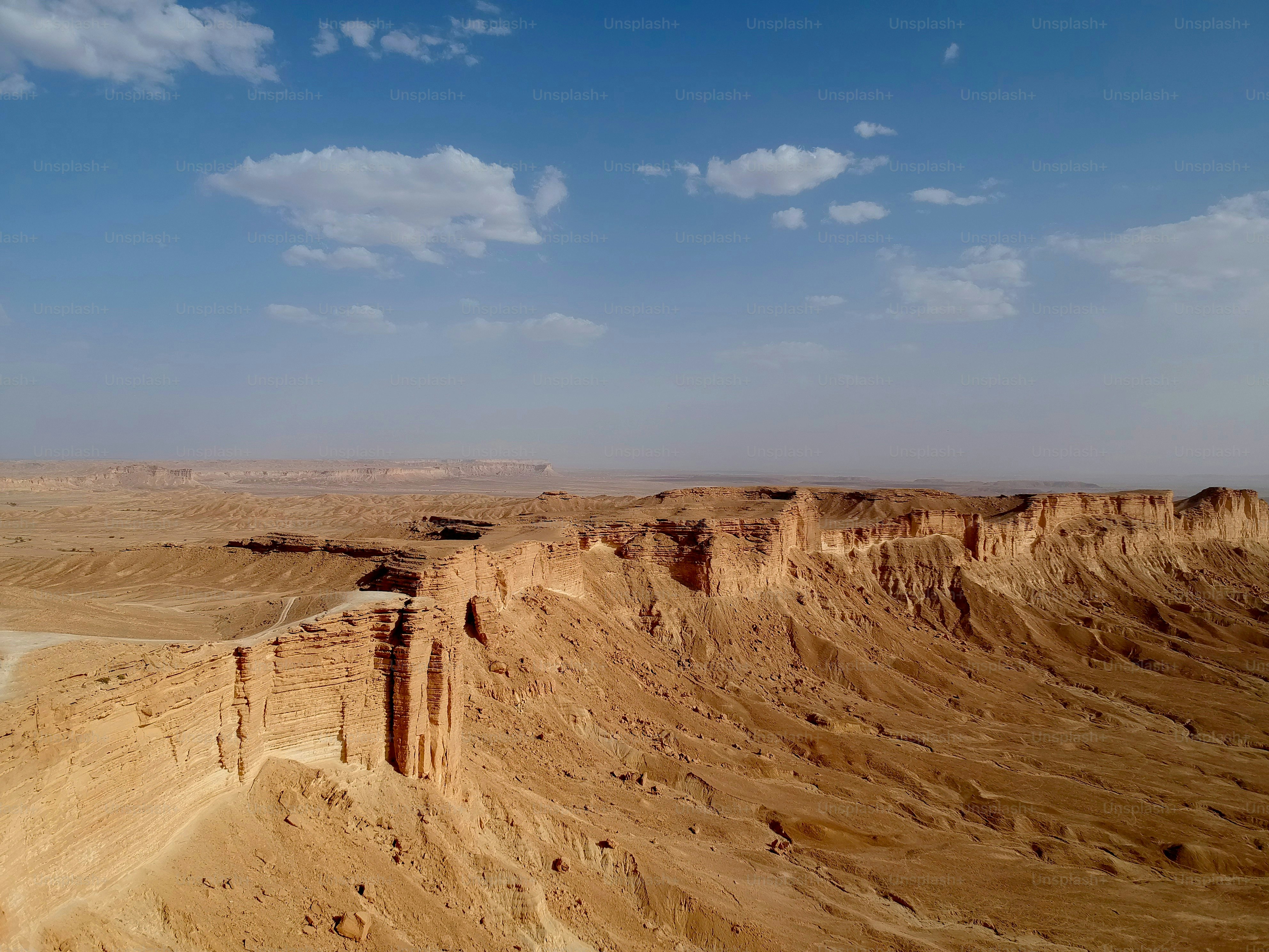A view from drone of The Edge of the World (Jebel Fihrayn), an ...