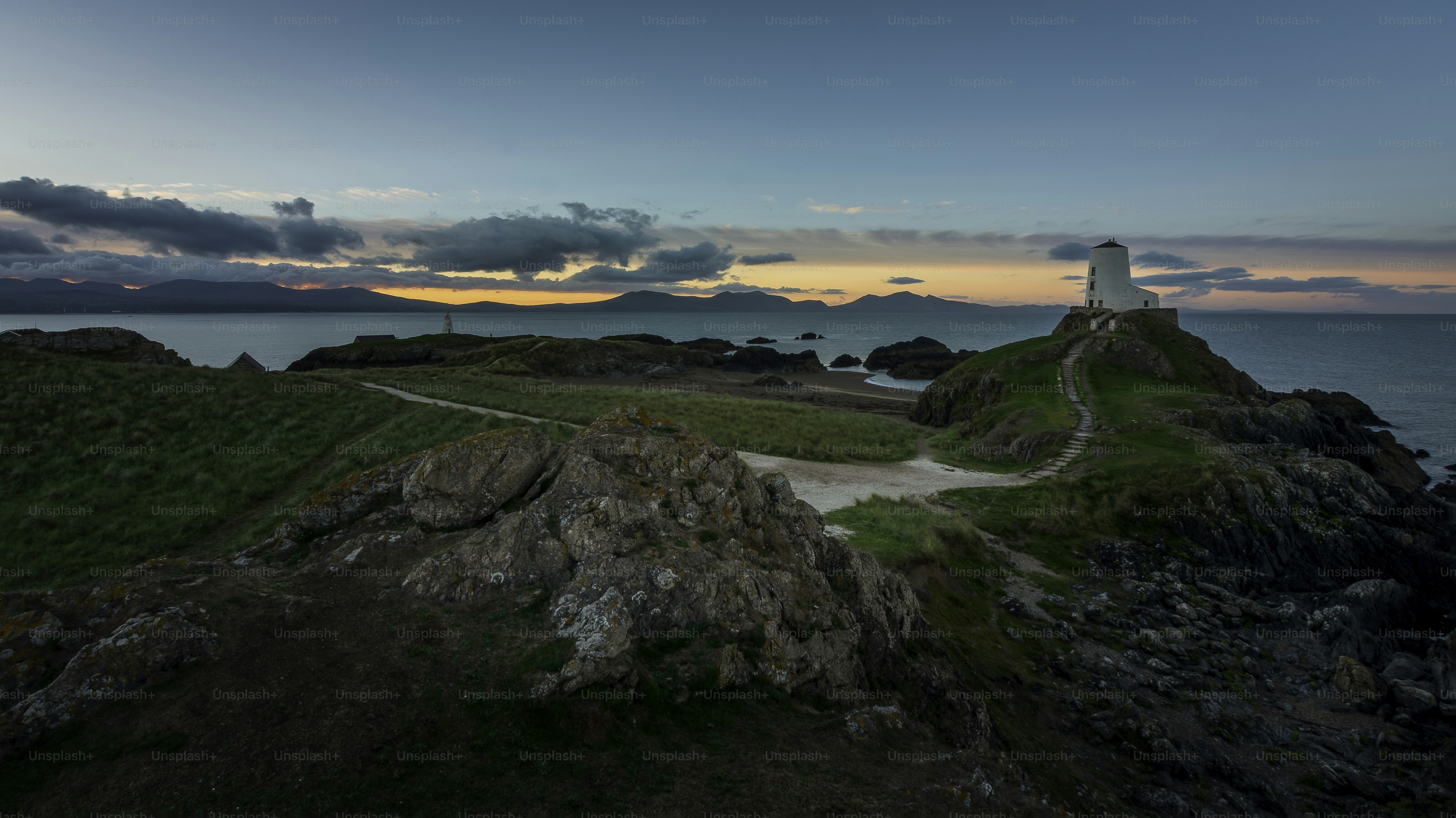 Theview of Twr Mawr Lighthouse in Ynys Llanddwyn, Anglesey, Wales, UK ...
