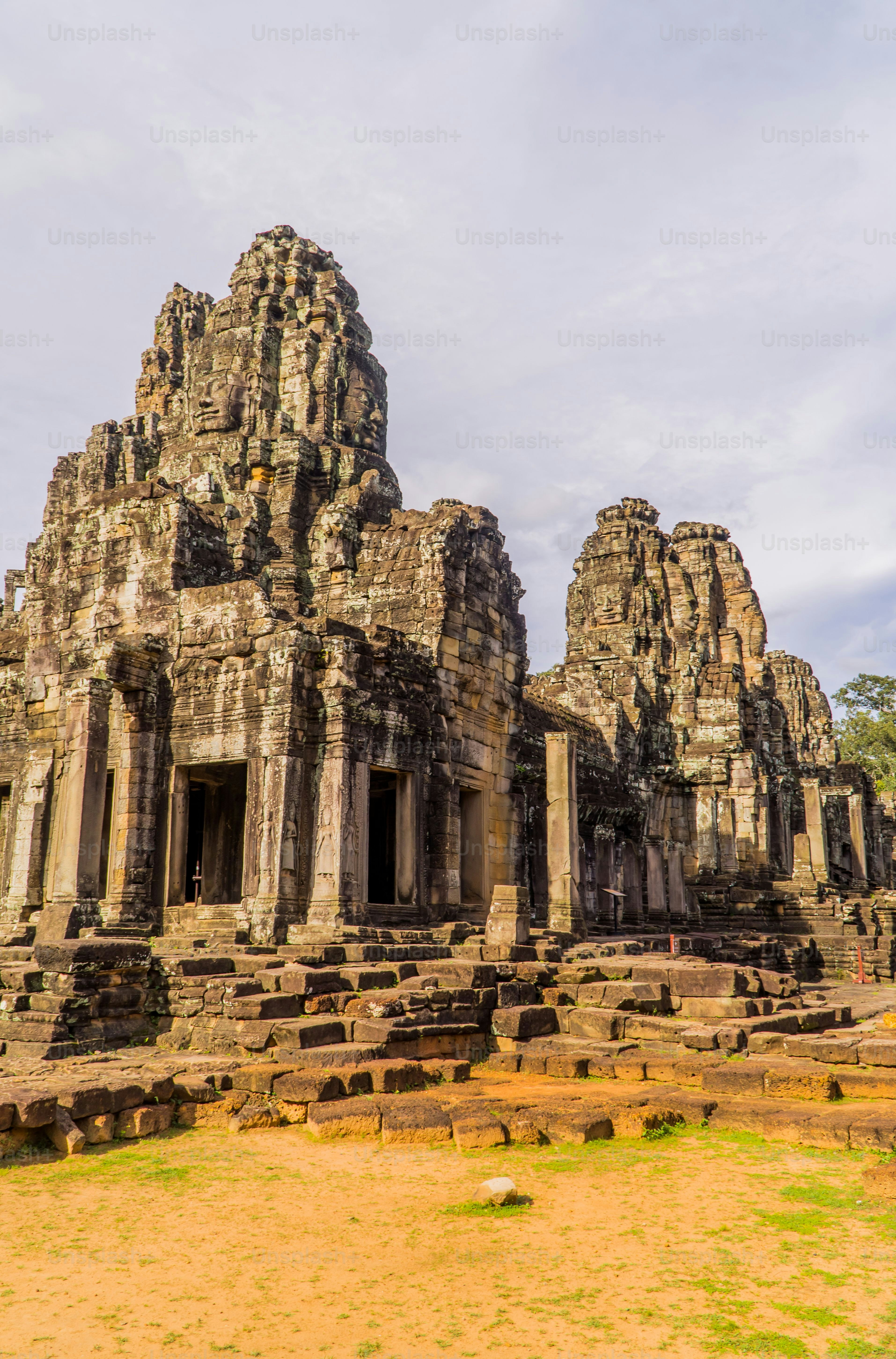 A vertical shot of the Bayon Temple inside Angkor Wat temple complex ...