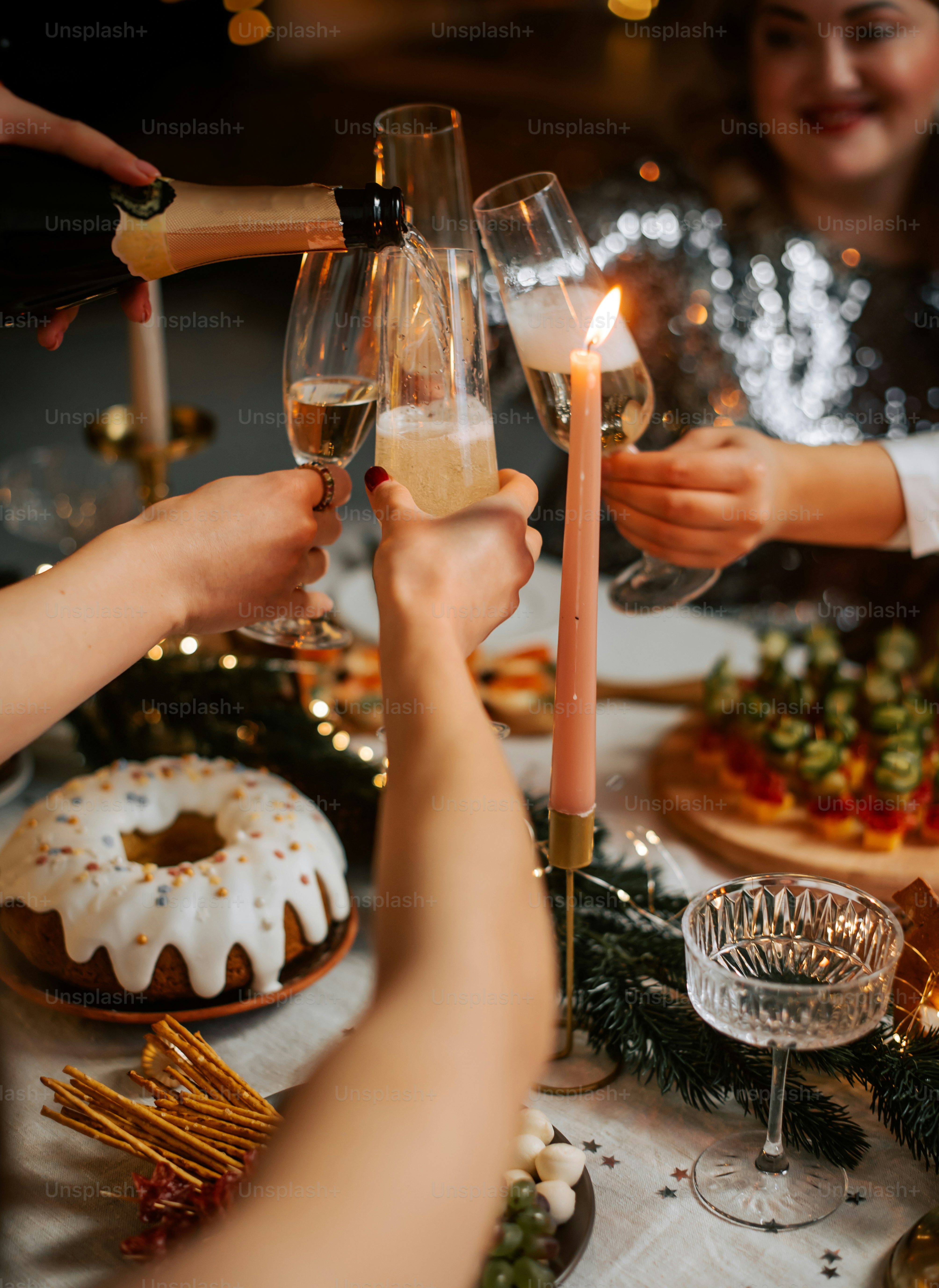 A group of people toasting with wine glasses photo – Champagne toast ...
