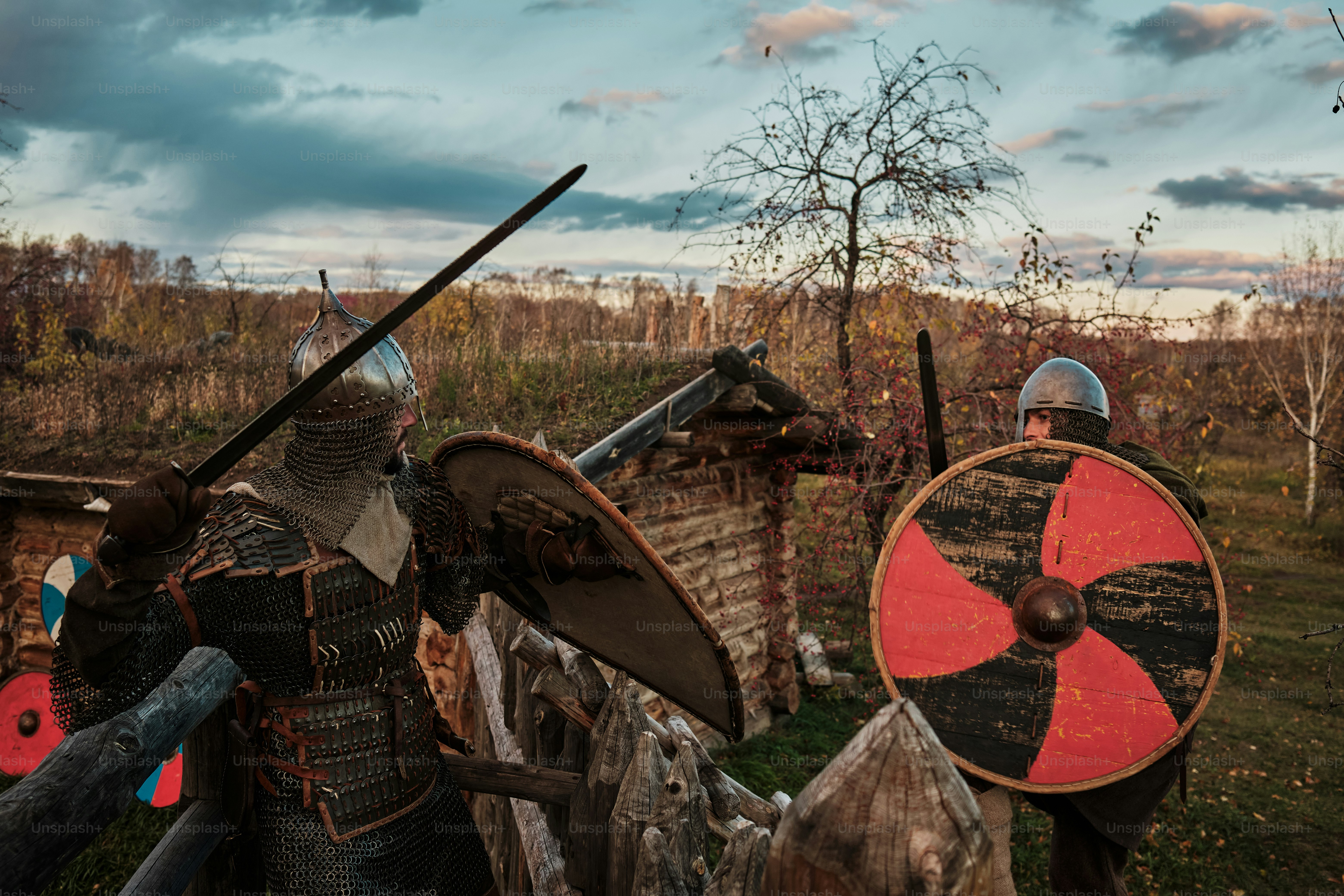A couple of knights standing next to each other photo – Medieval Image ...