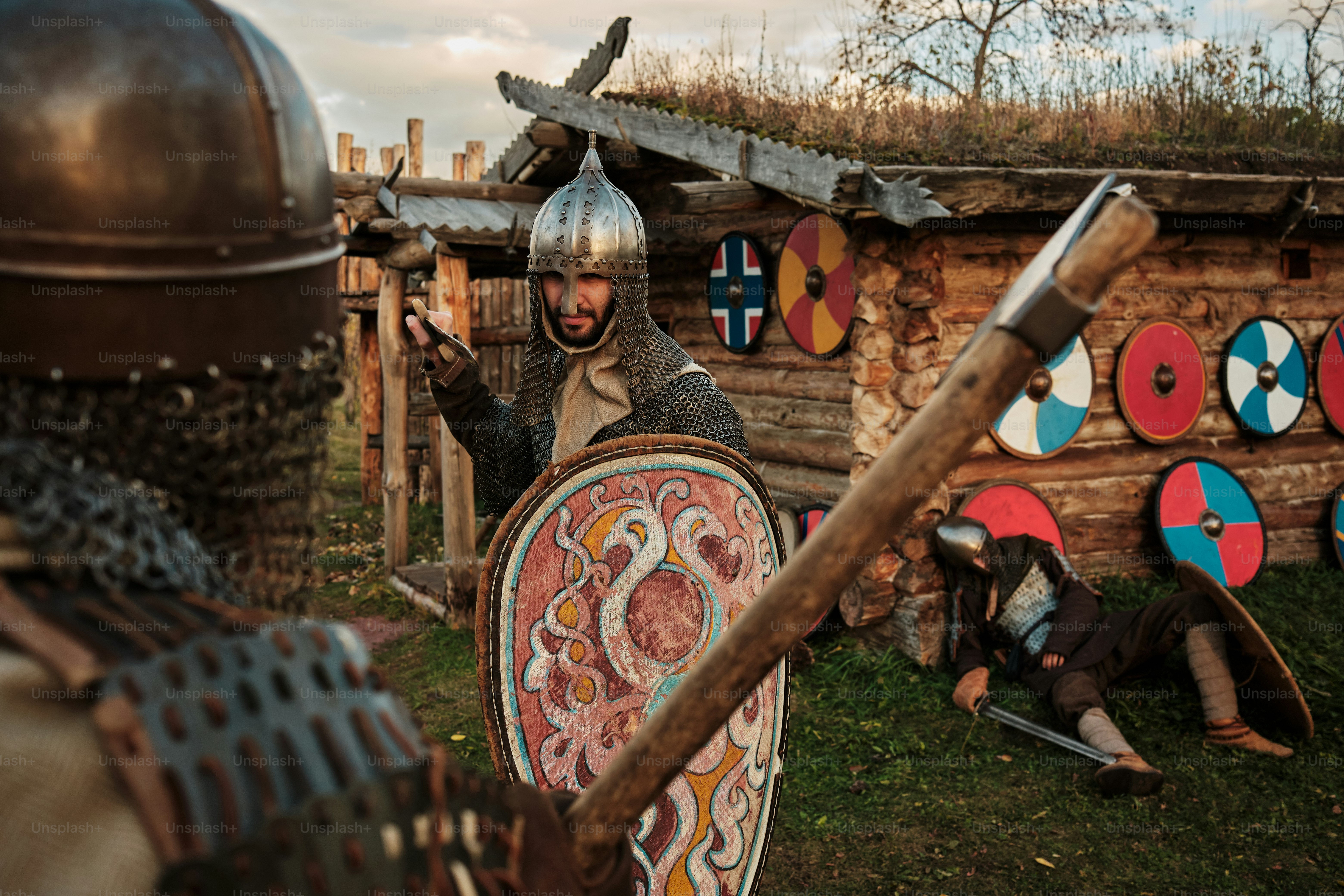 A couple of men in armor kissing each other photo – Man Image on Unsplash